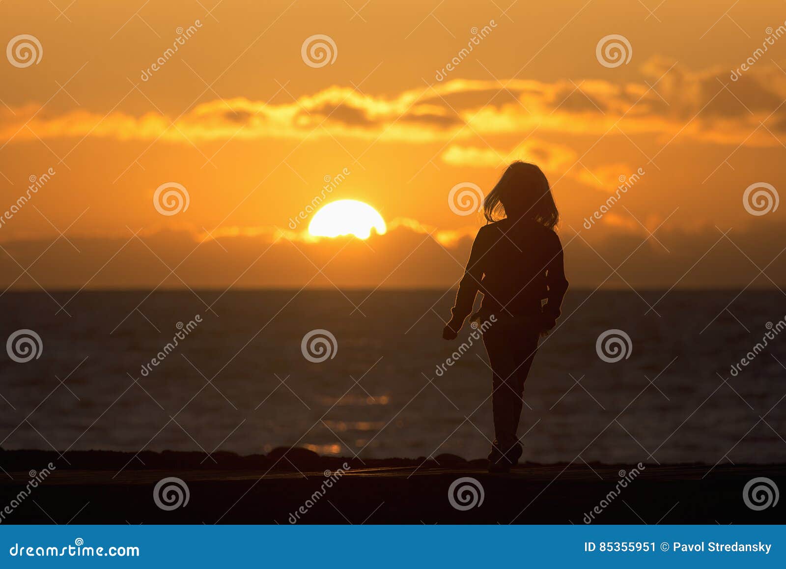 Child on sunset beach stock image. Image of recreation - 85355951