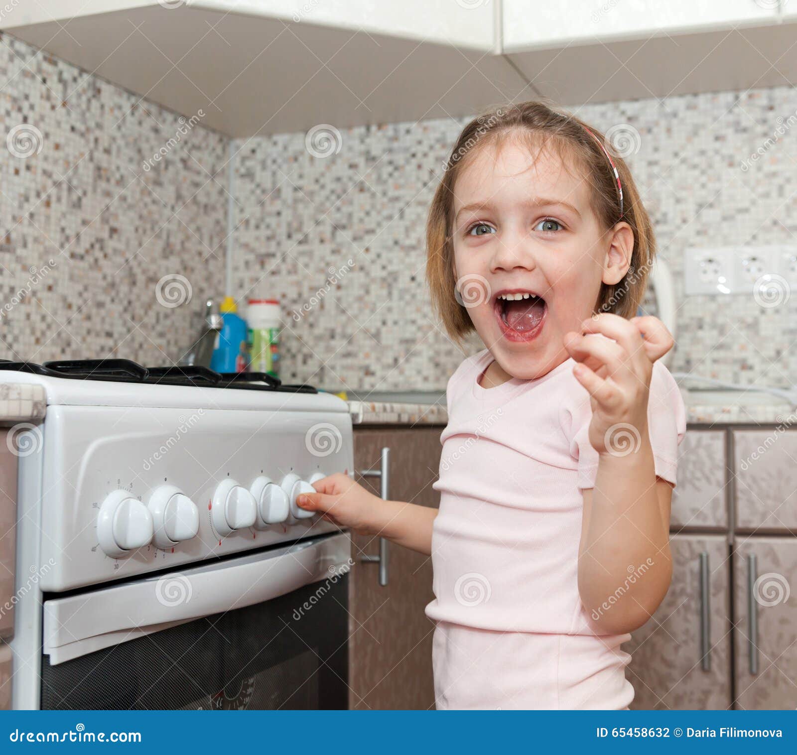 Child without Supervision Playing with Stove Stock Photo - Image of ...