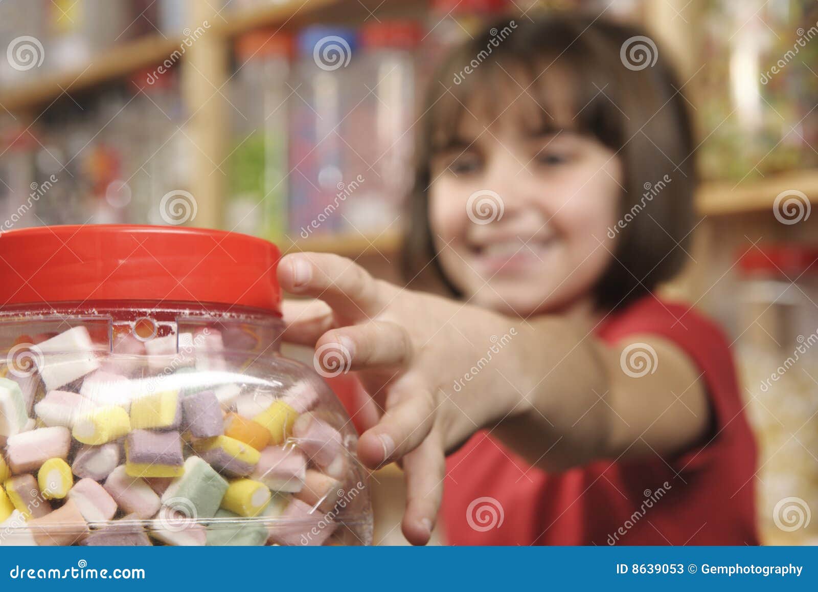Child in sweet shop stock image. Image of emotion, expression - 8639053