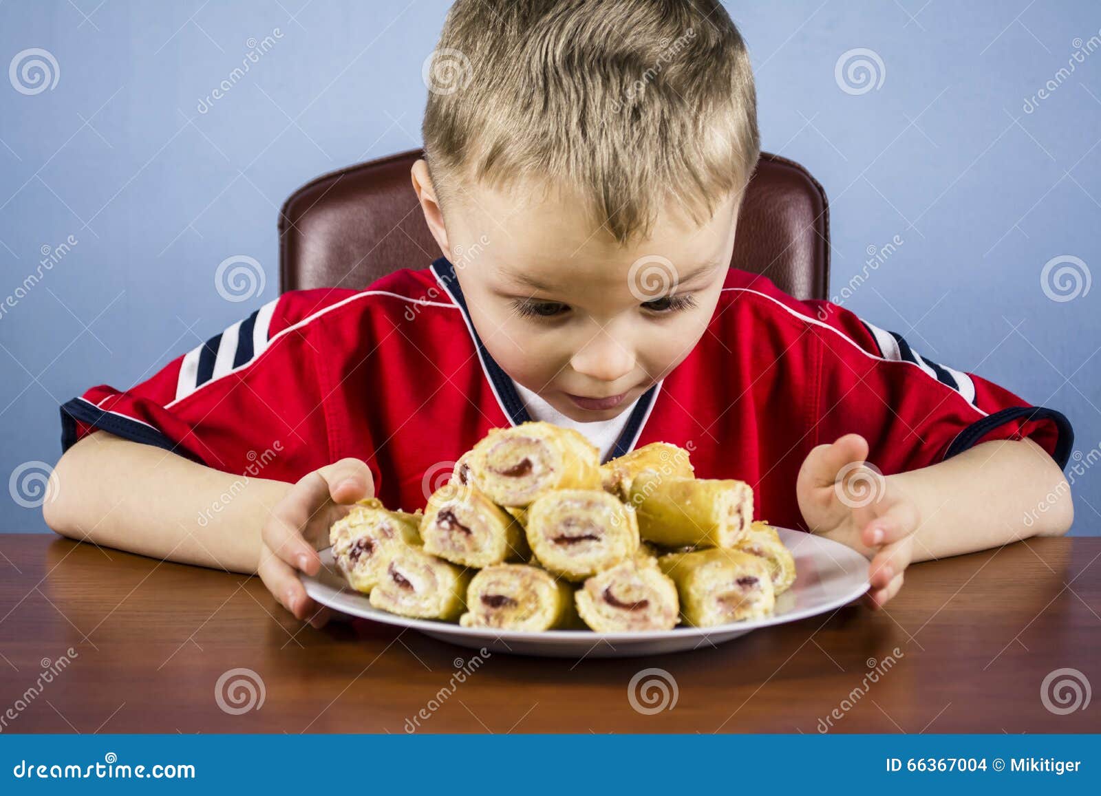 Child with sweets stock photo. Image of wooden, cake - 66367004