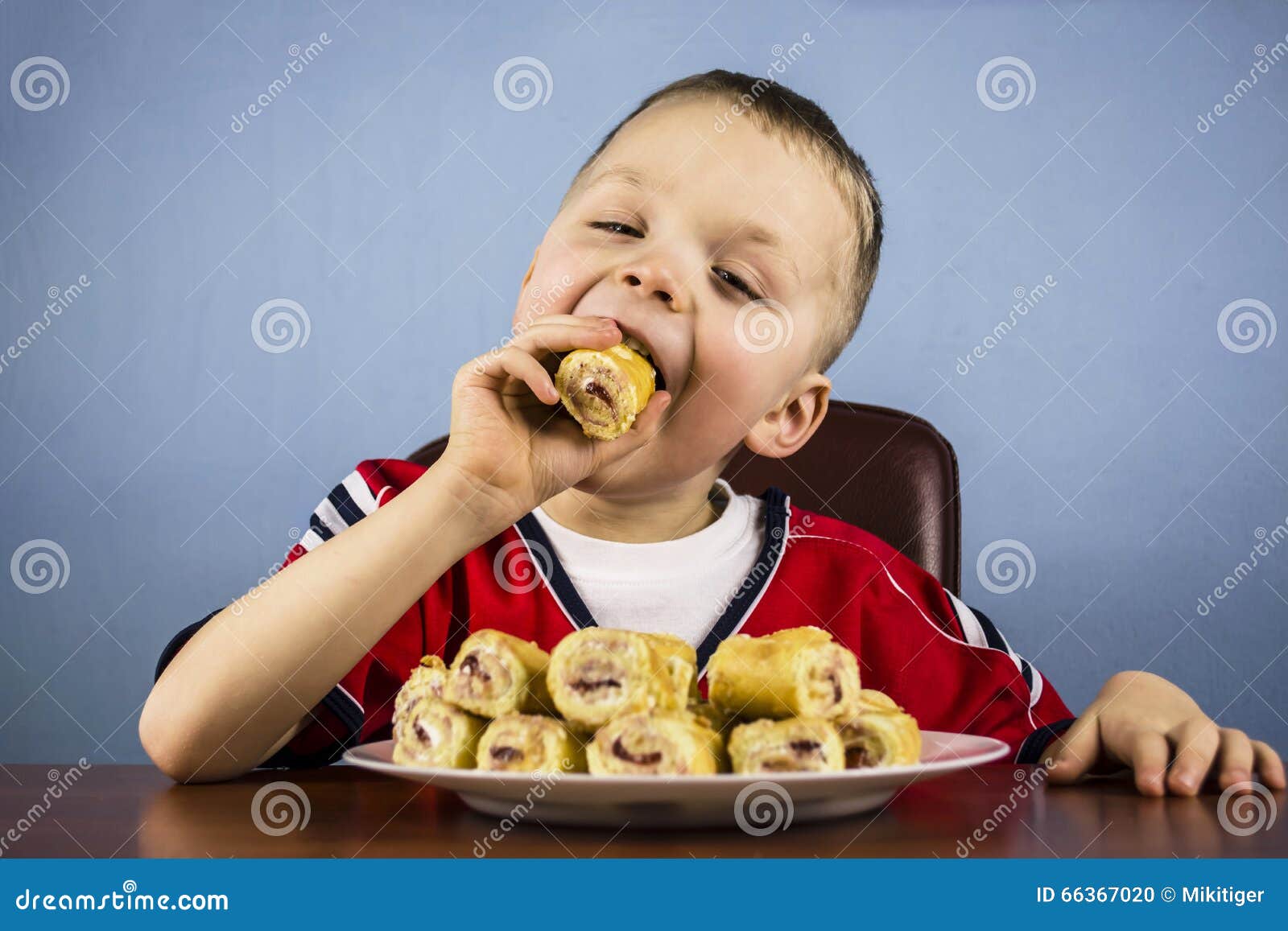 Child with sweets stock photo. Image of plate, sweets - 66367020