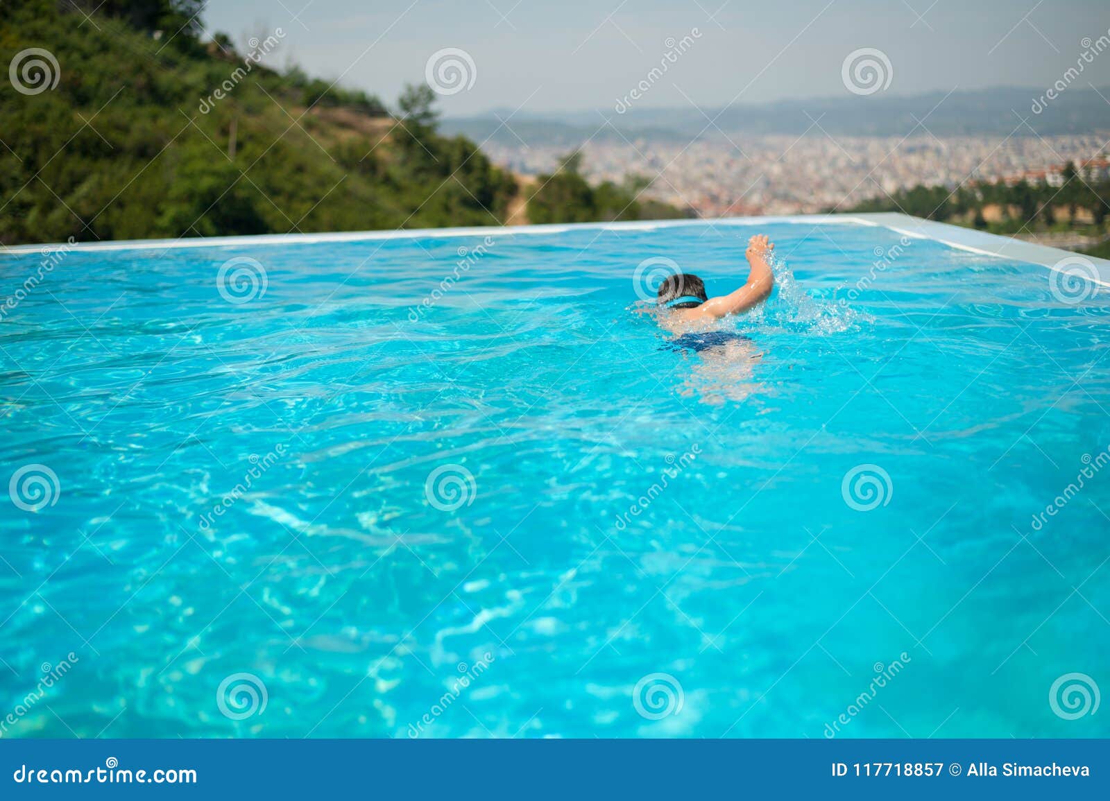 Child Swim in the Pool at the Hotel. View from Above Stock Image ...