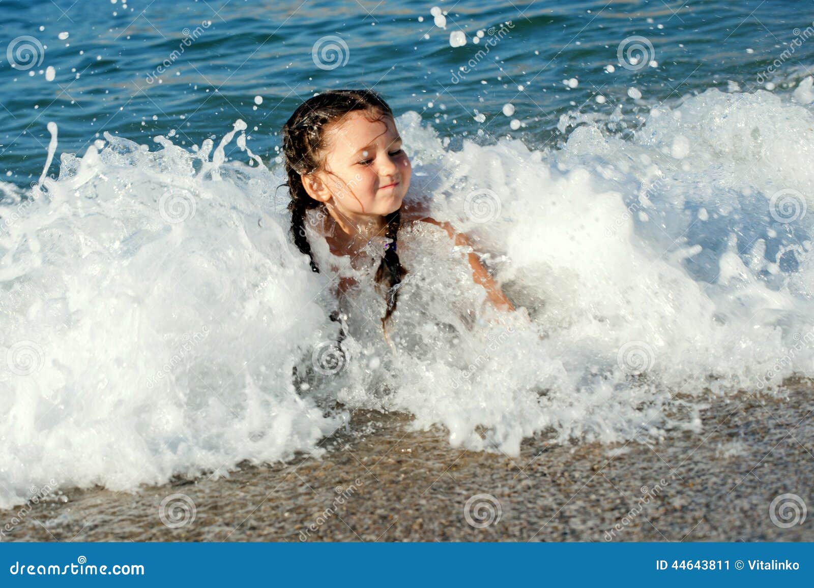 Child Swimming in the Sea in Waves. Stock Image - Image of holiday ...
