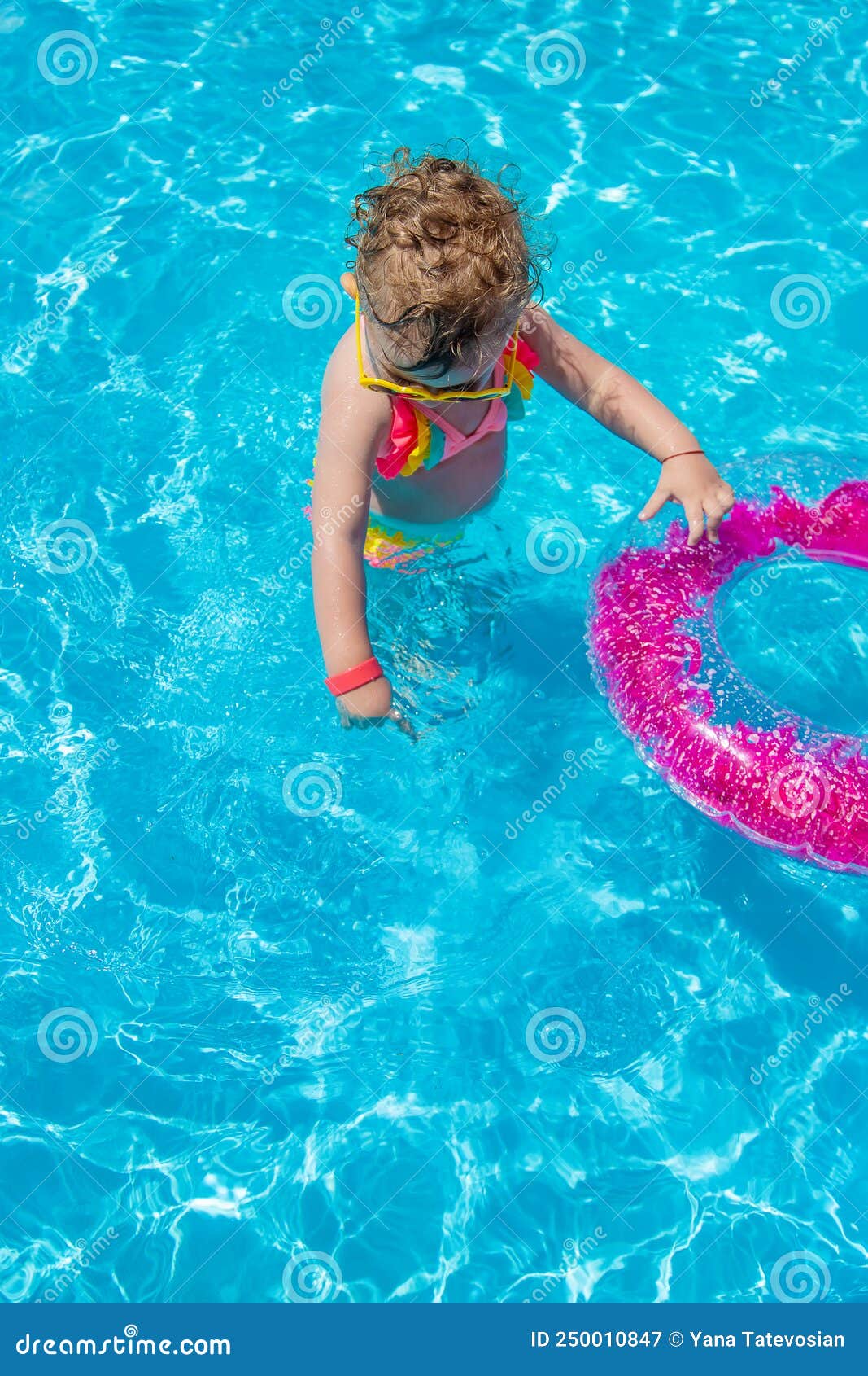 A Child Swims in a Pool with a Circle. Selection Focus Stock Image ...