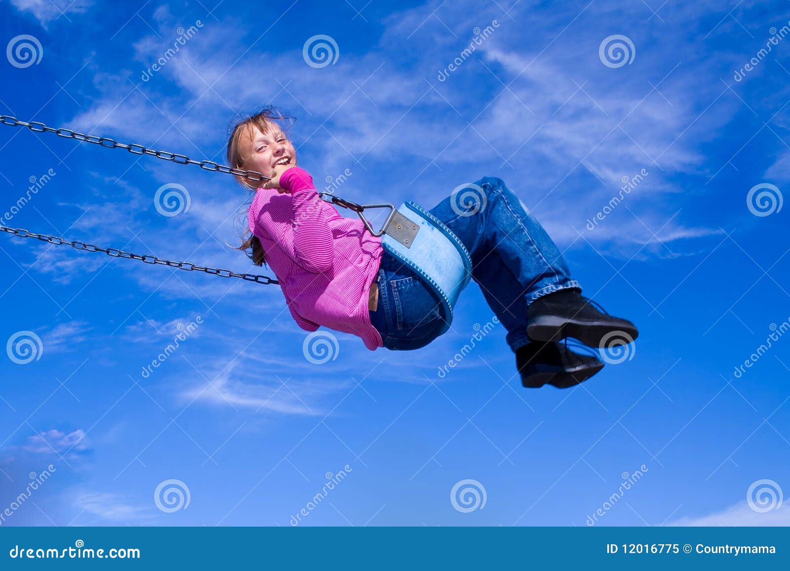 Child swinging in the sky. stock image. Image of exercising - 12016775