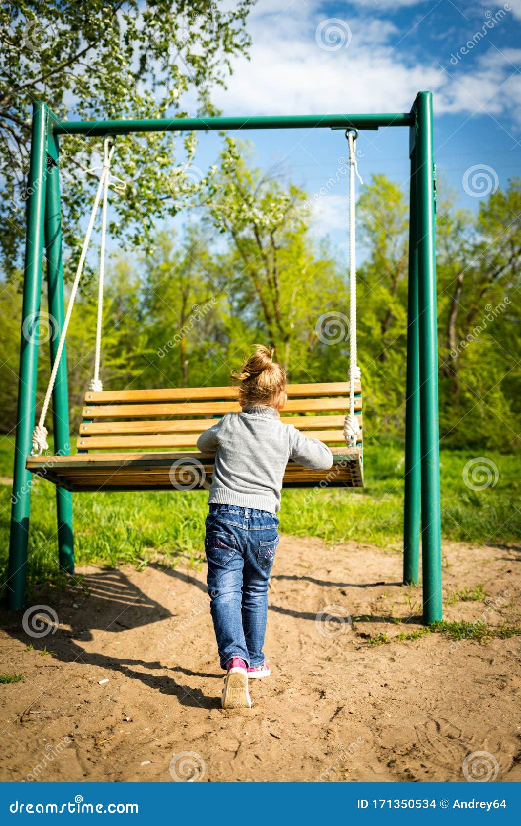 Child Swinging a Swing. Child Sitting on a Swing Stock Photo - Image of ...
