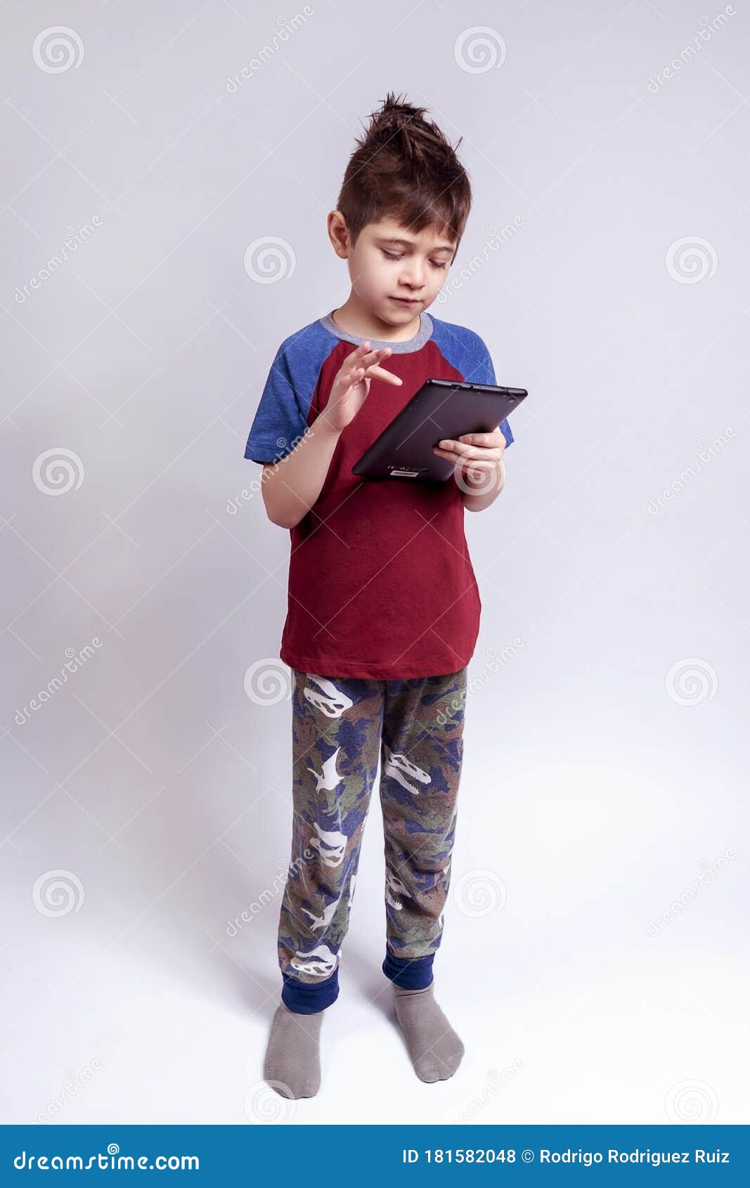 Child with a Tablet in Hand and Elearning Stock Photo - Image of ...