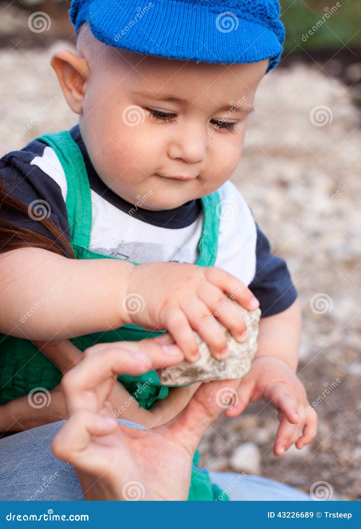 Child Takes A Stone From Mother Hand Stock Image | CartoonDealer.com ...