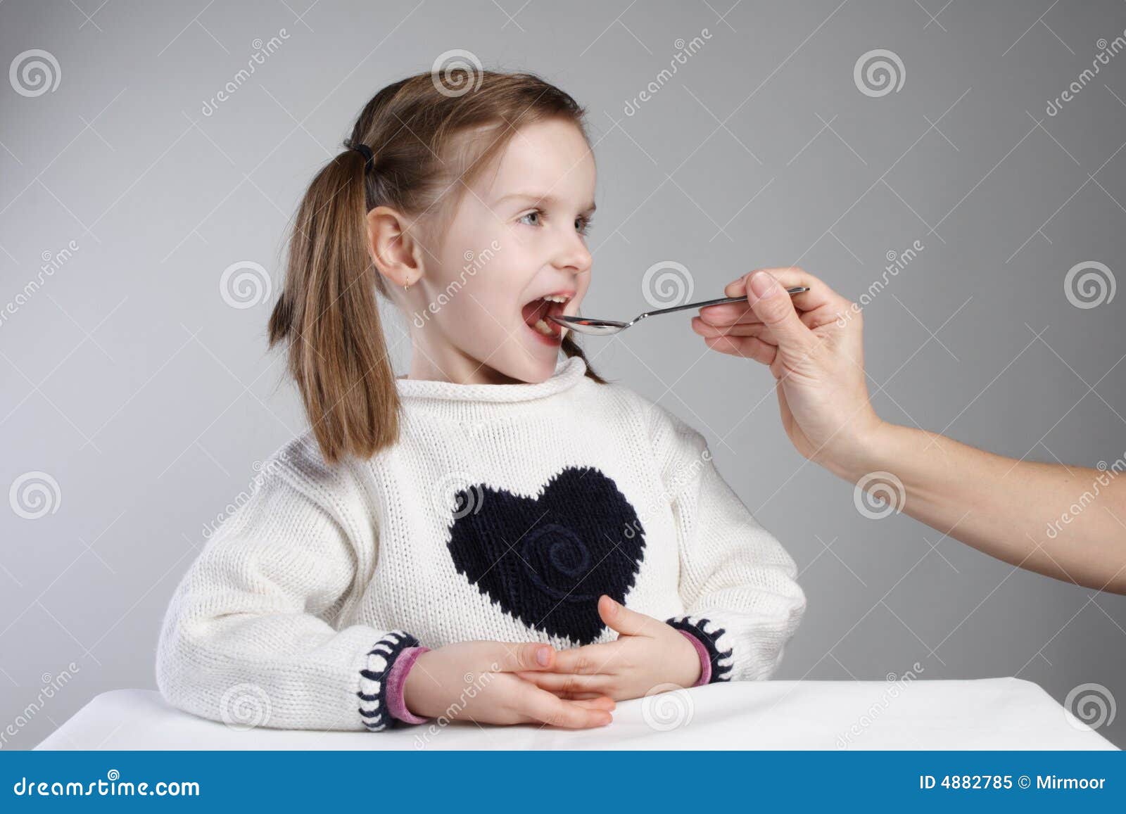Child taking medication stock image. Image of reliever - 4882785