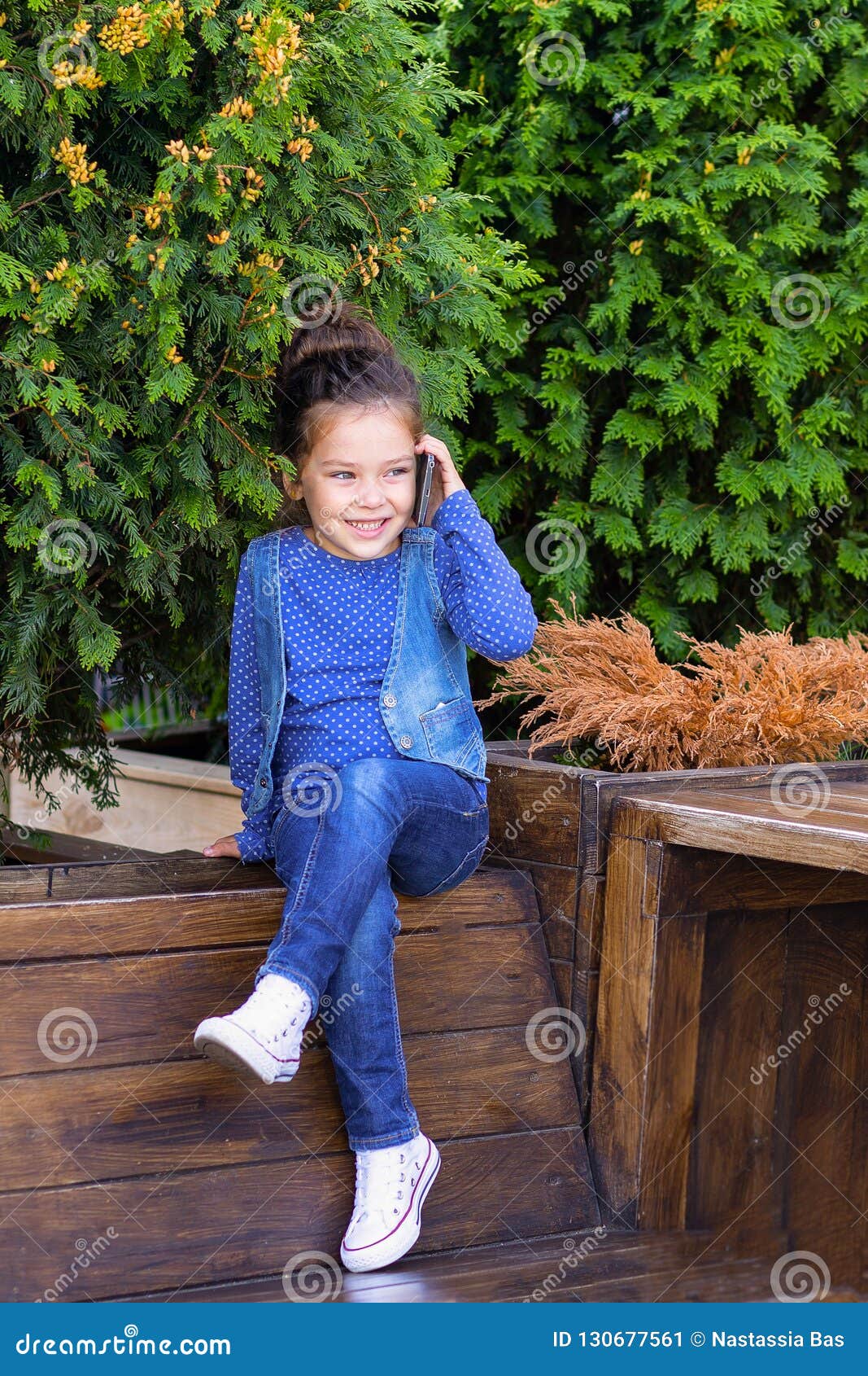 Child Talking on the Phone and Smiling.Vertical Stock Image - Image of ...