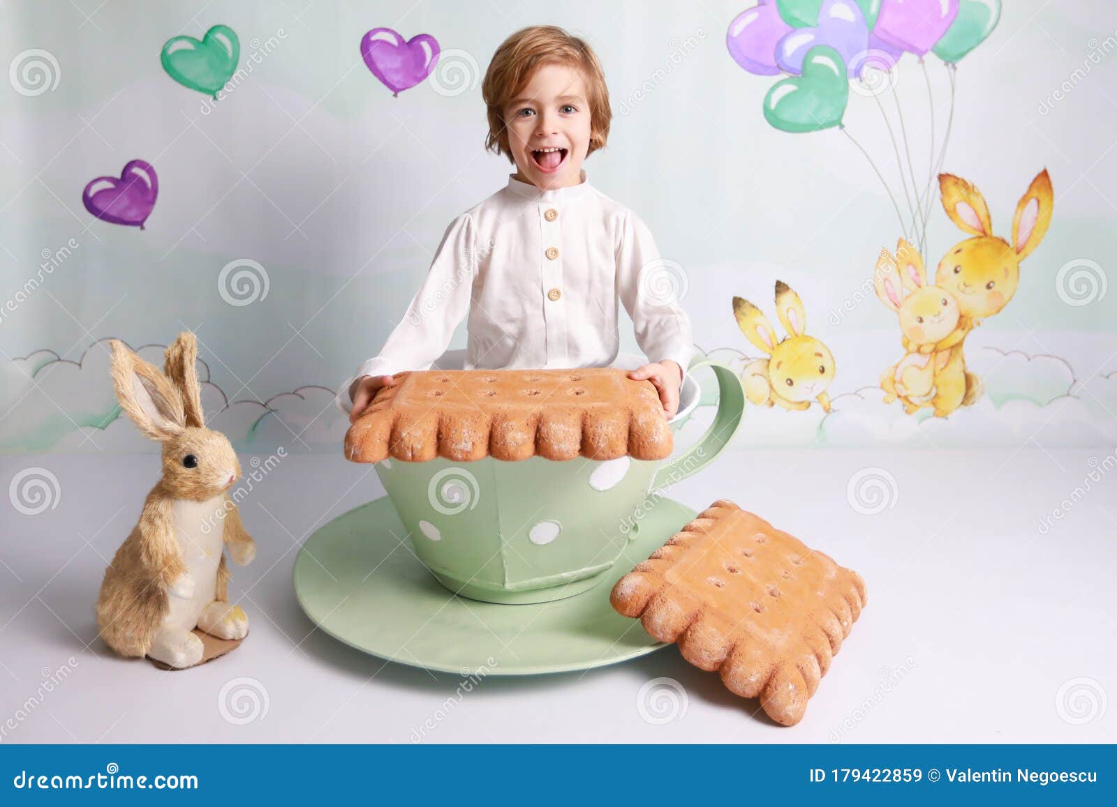Child in tea cup stock image. Image of studio, spring - 179422859