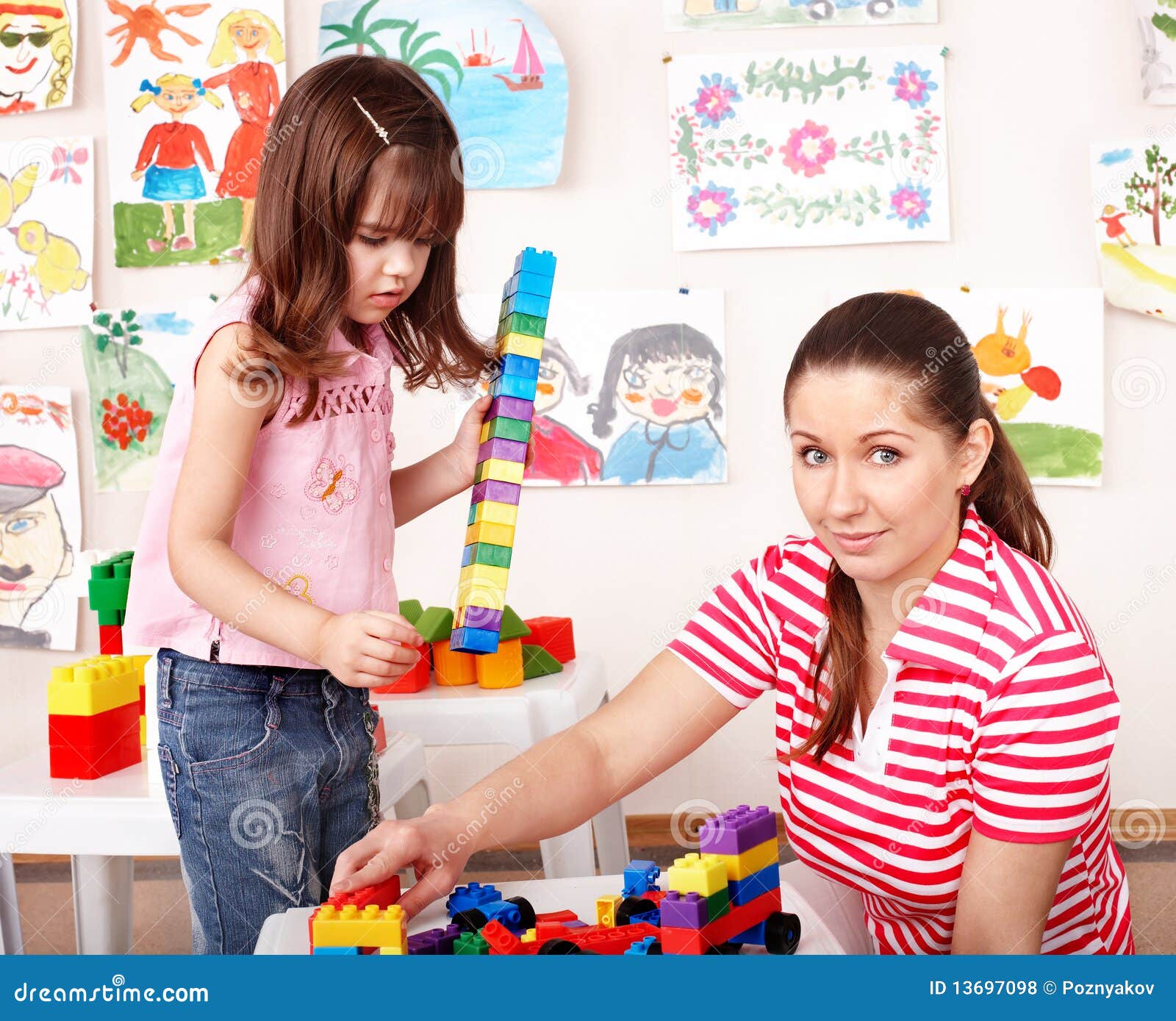 Child and Teacher with Construction Lego . Stock Photo - Image of ...