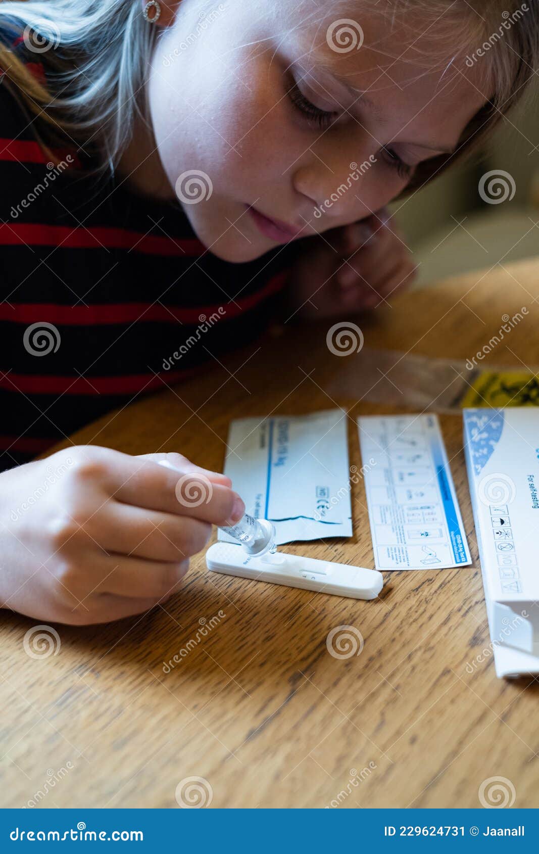 Child Testing Herself for Coronavirus at Home Editorial Photo - Image ...