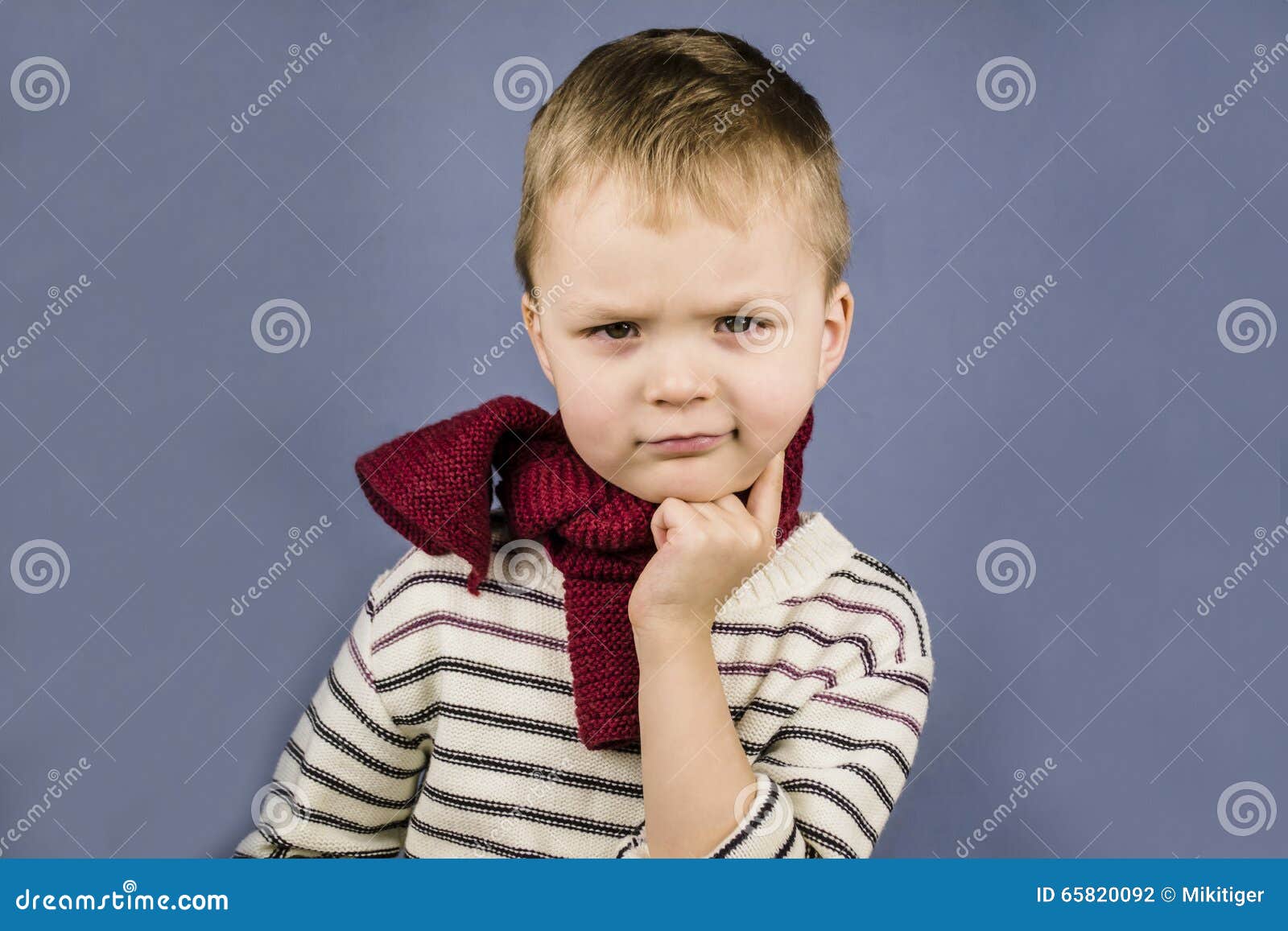 Child thinking stock photo. Image of annoyed, rukalitso - 65820092
