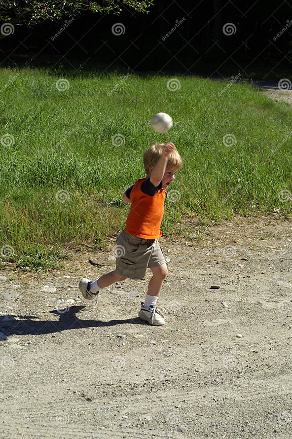 Child throwing a ball stock photo. Image of game, toss - 6940510