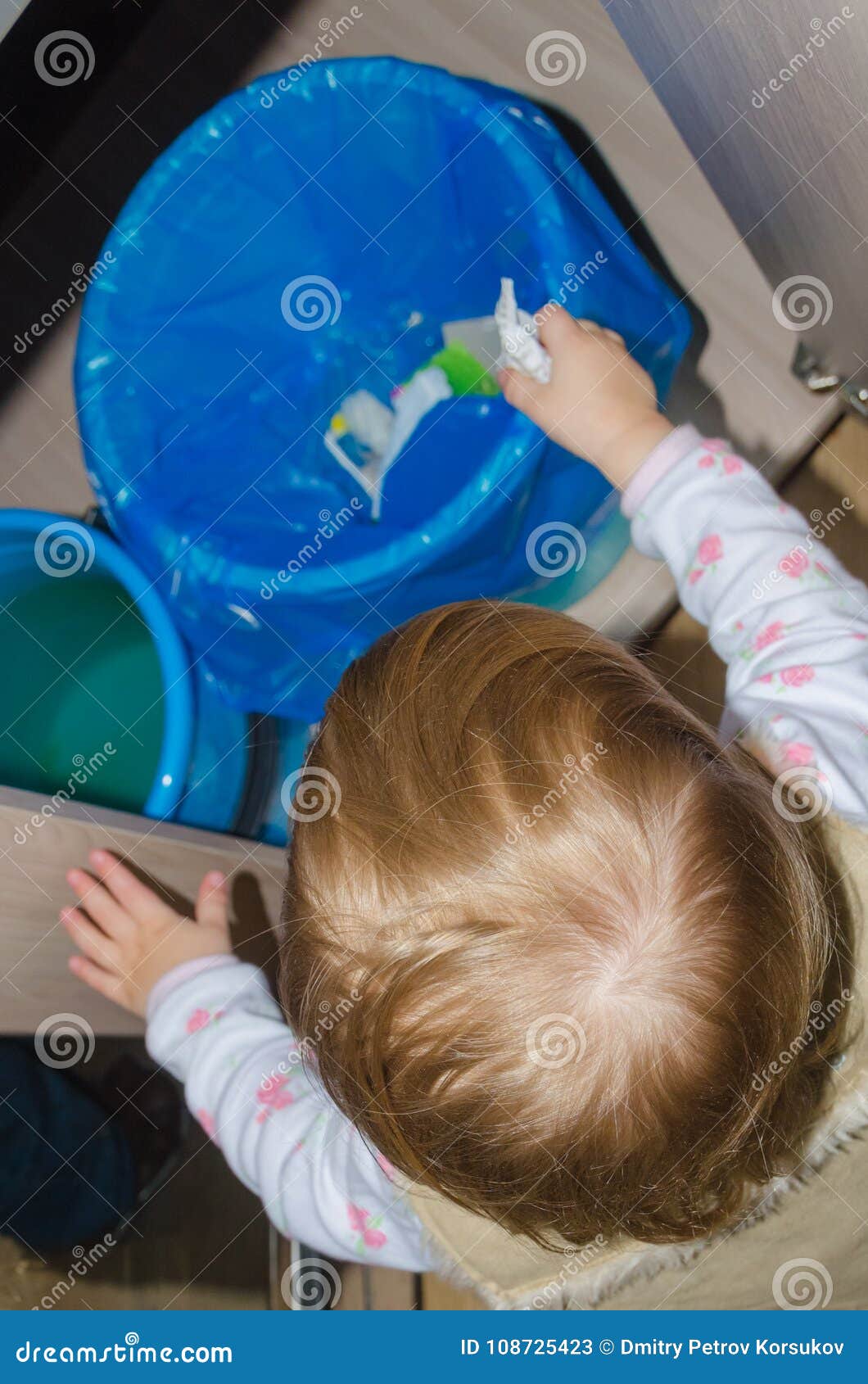 Child Throws the Garbage into the Bucket Stock Image - Image of ...