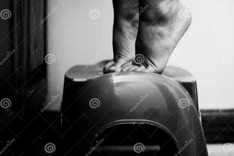 Child on Tip Toes stock image. Image of toes, stool, feet - 27510193