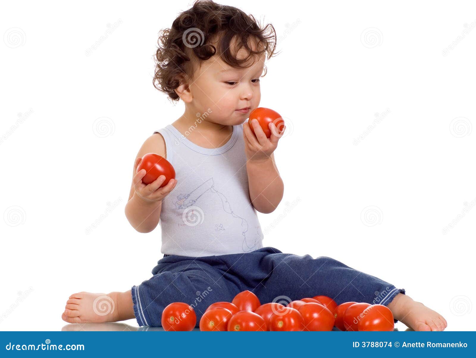 Child With Tomato. Stock Photo | CartoonDealer.com #3788074