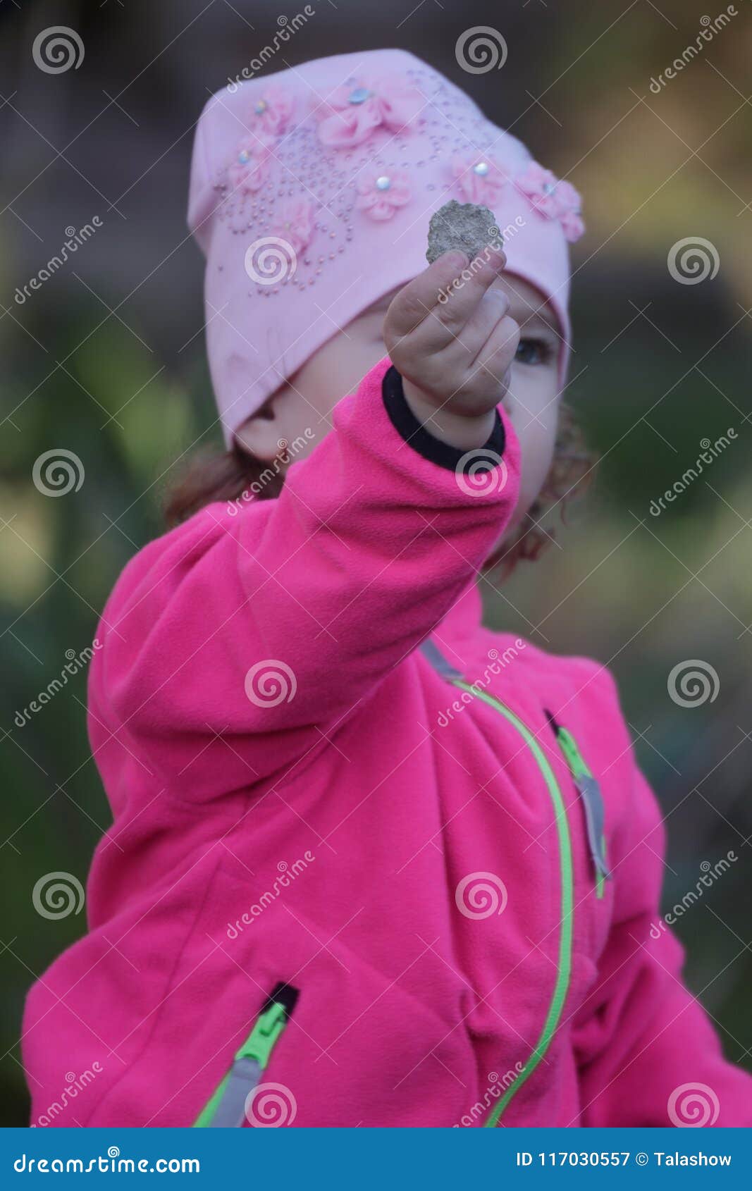 Child Took a Small Stone in His Hand and Pulled it Upward Stock Image ...