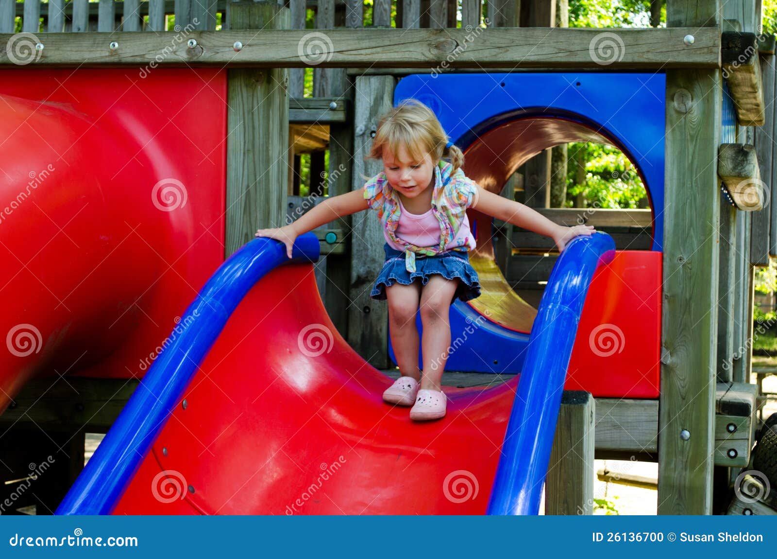 Child At Top Of Slide Stock Photo - Image: 26136700