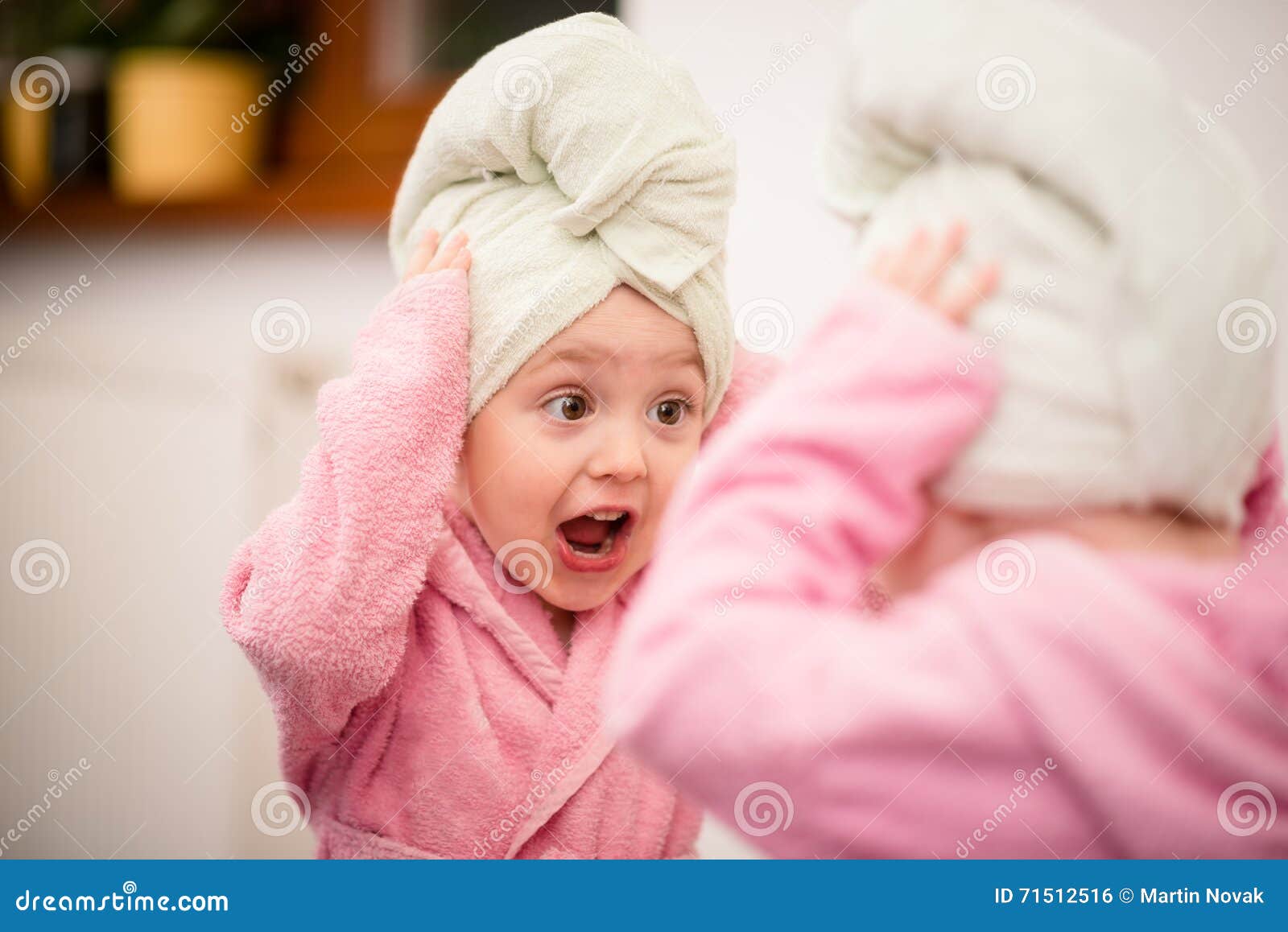 Child with towel on head stock photo. Image of looking - 71512516