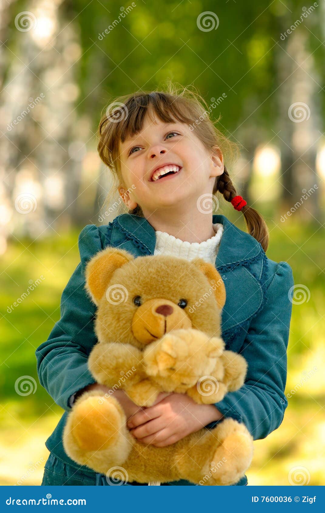 Child with toy bear cub stock photo. Image of daughter - 7600036