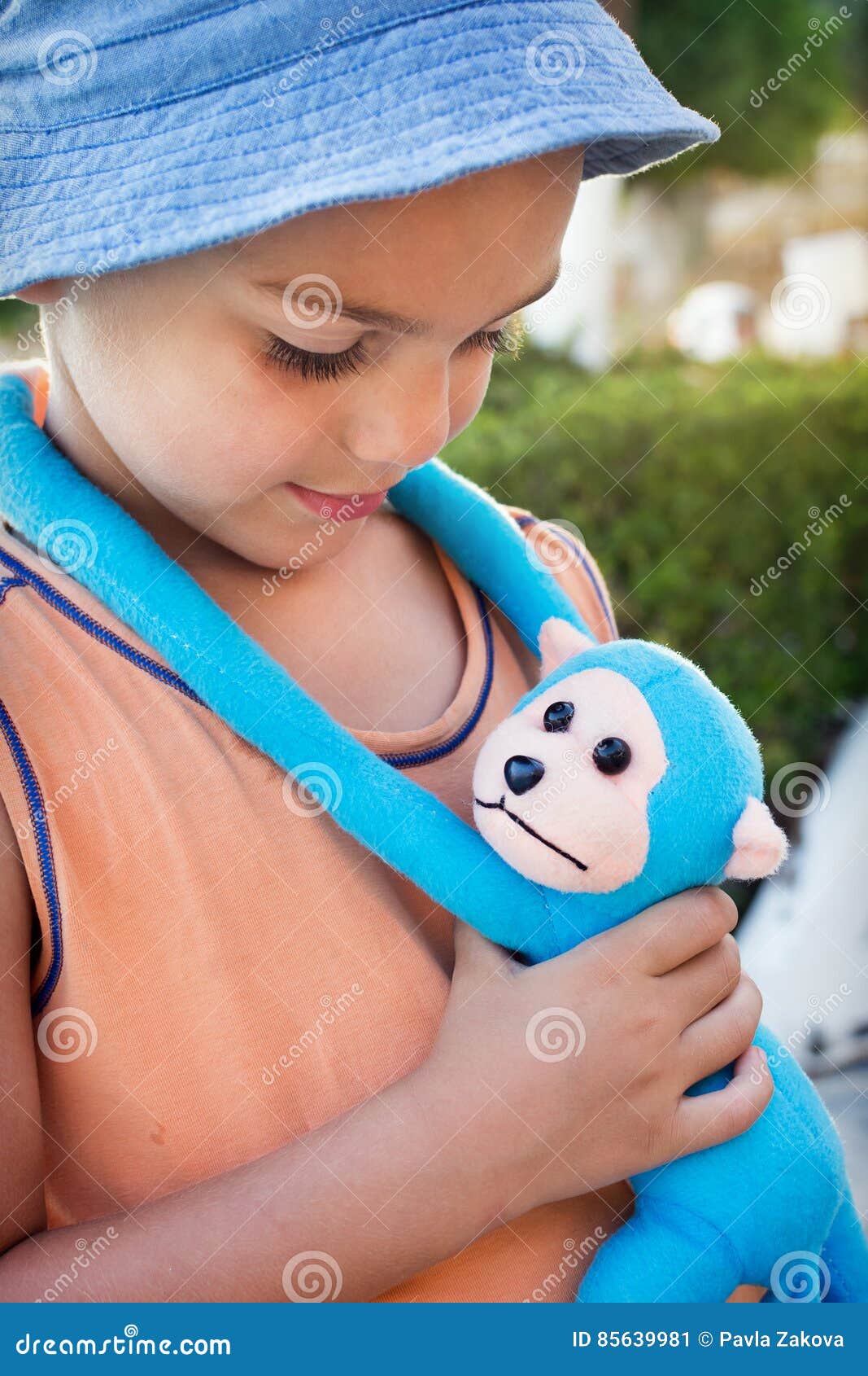 Child with toy monkey stock image. Image of beautiful - 85639981
