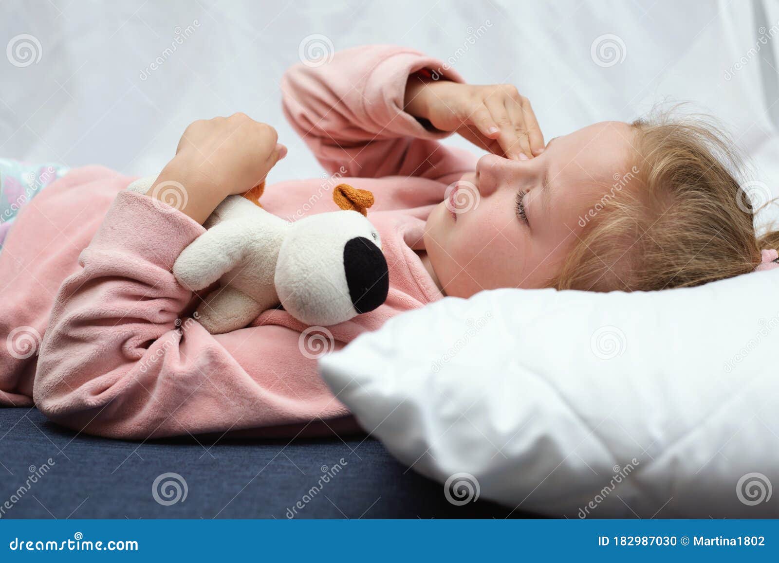 Child girl crying in bed stock photo. Image of sleepless - 182987030