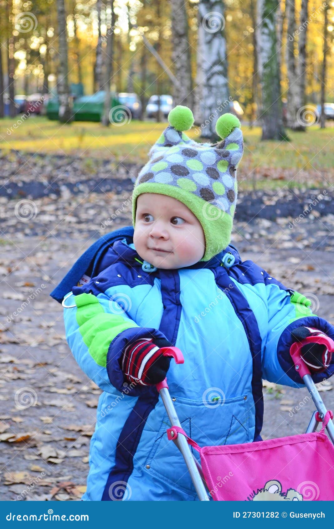 Child with a toy stroller stock photo. Image of caucasian - 27301282