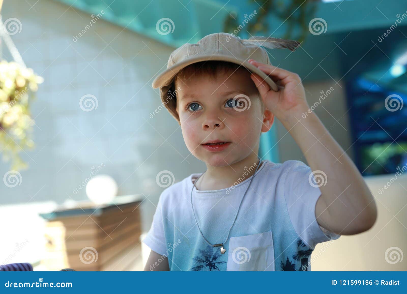 Child trying on cap stock photo. Image of russian, innocence - 121599186