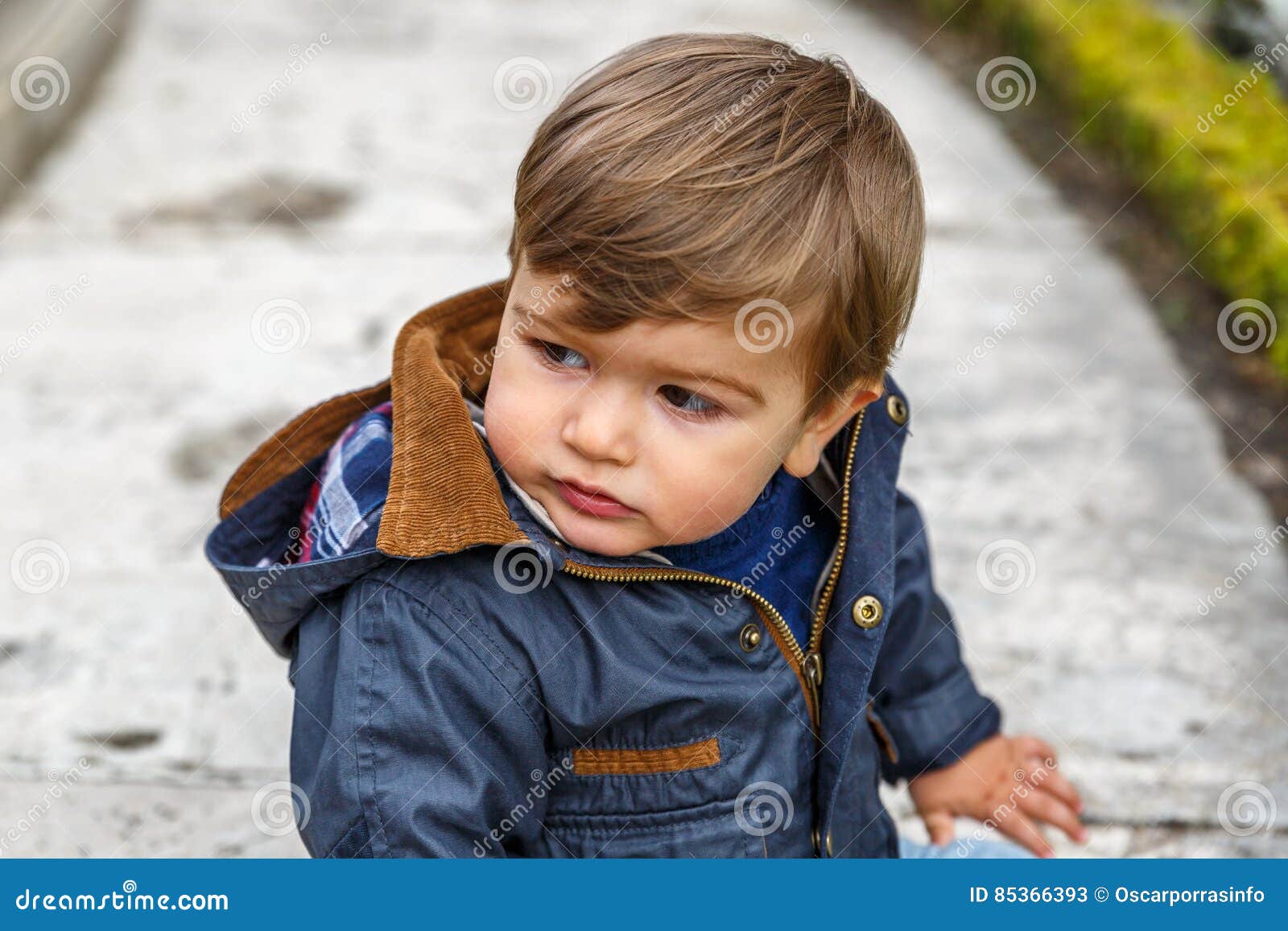 A Child Turns His Head with Concern Stock Image - Image of calf, little ...