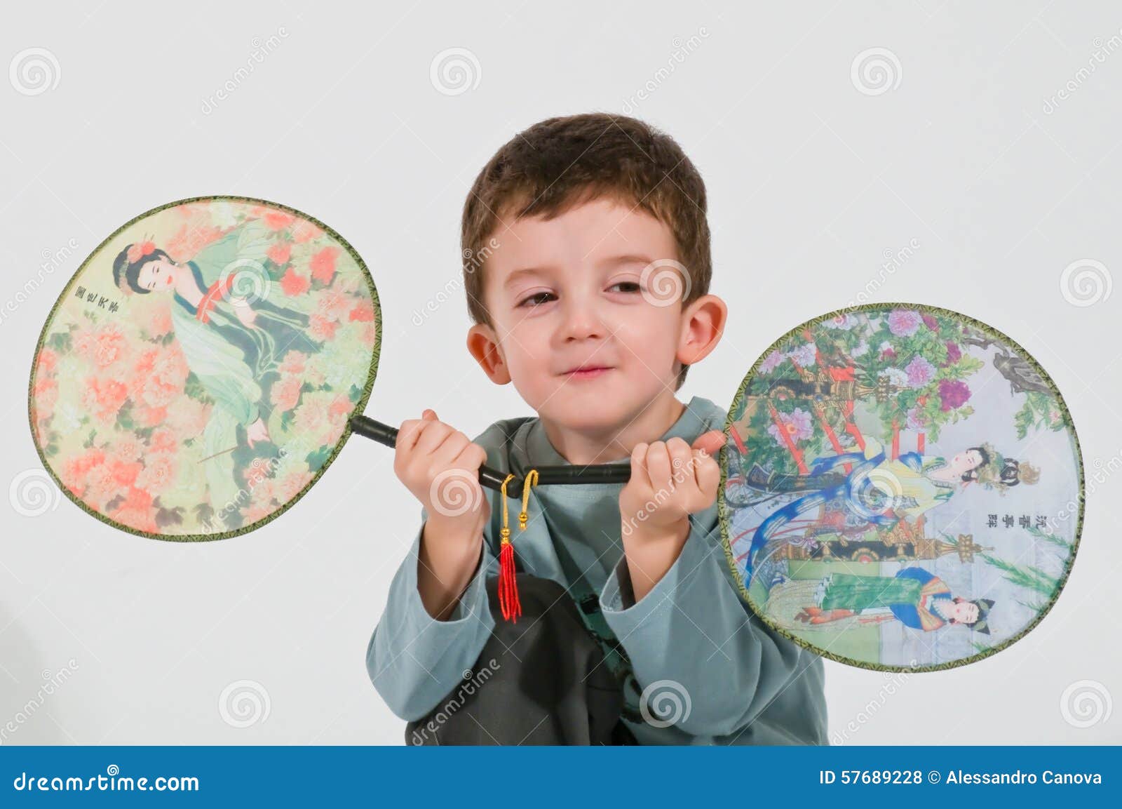 Child with Two Fans in Hand Stock Photo - Image of smile, faces: 57689228