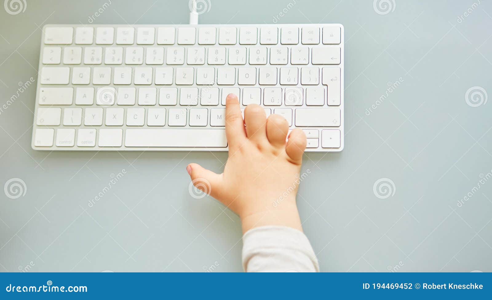 Child Types on Computer Keyboard with Index Finger Stock Photo - Image ...