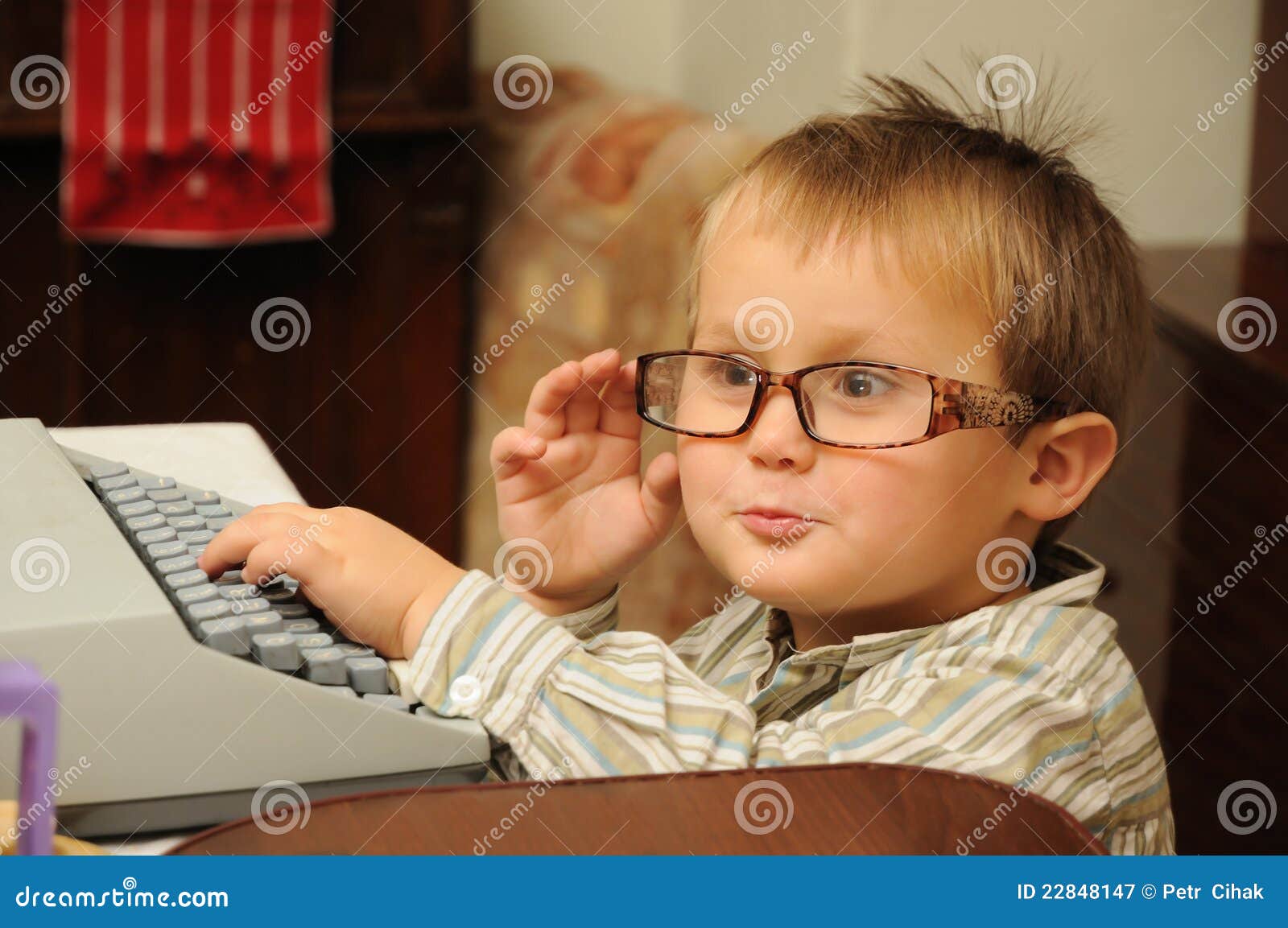 Child with typewriter stock image. Image of typewriter - 22848147
