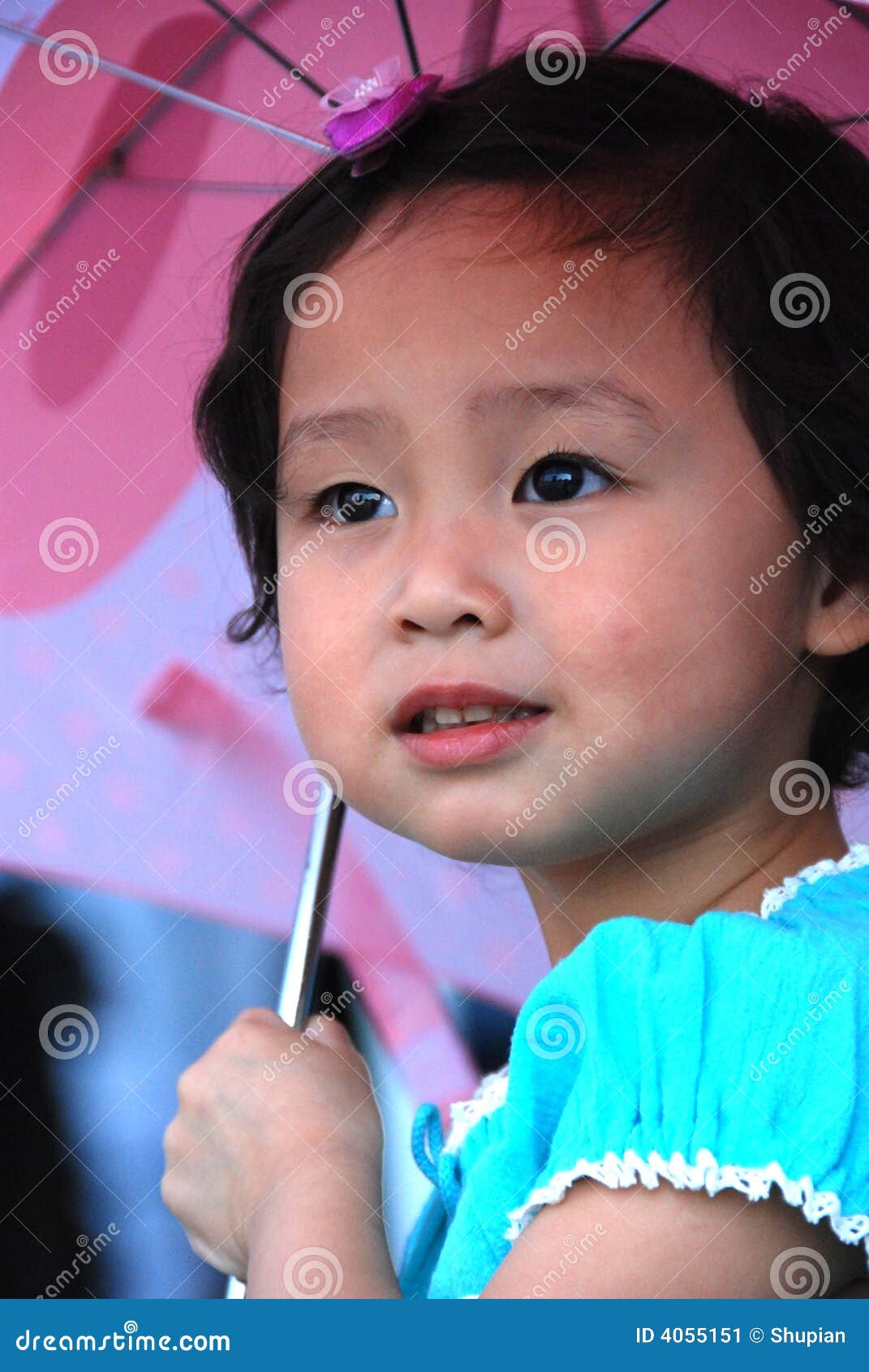 Child Under Umbrella Picture. Image: 4055151