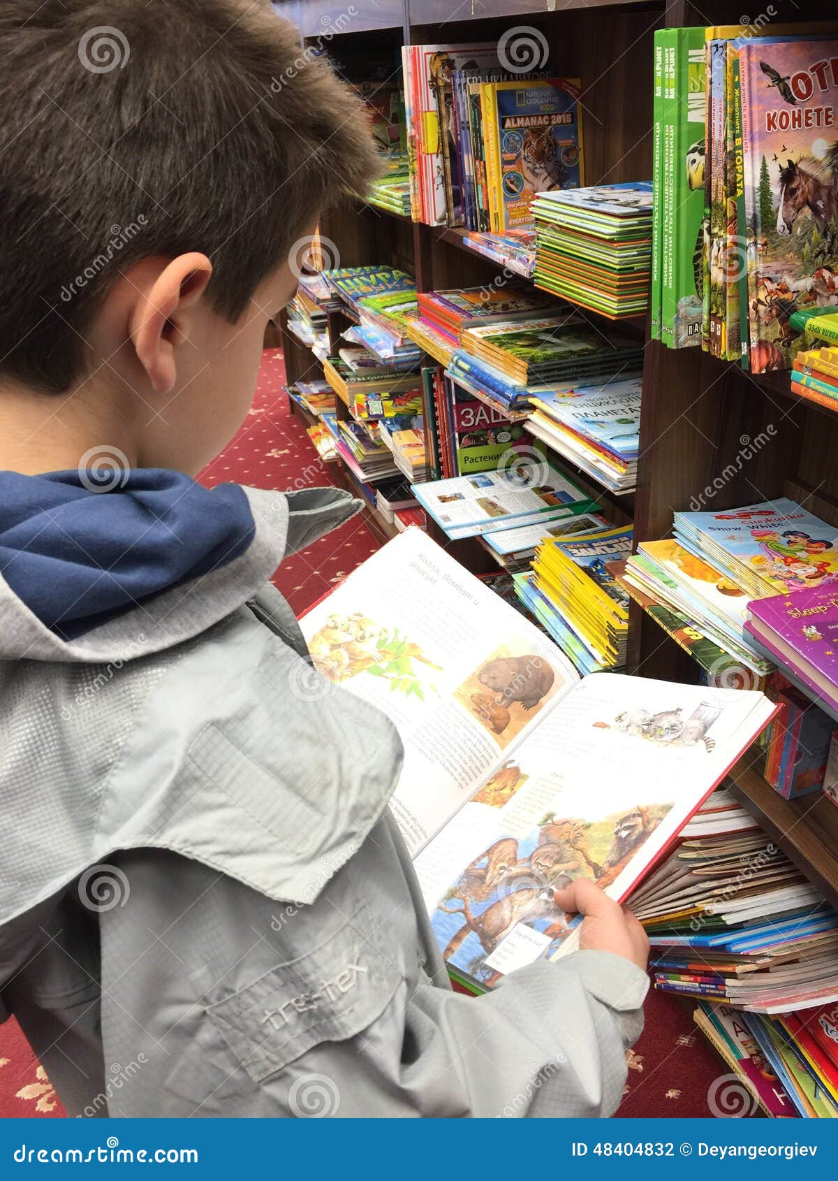 Child with Unfold Book in a Bookstore Editorial Photography - Image of ...