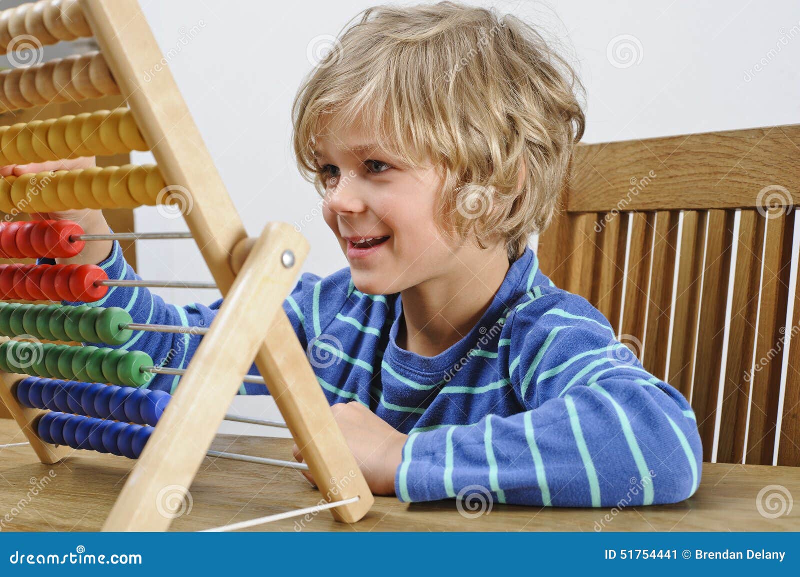 Child using an abacus stock image. Image of homework - 51754441