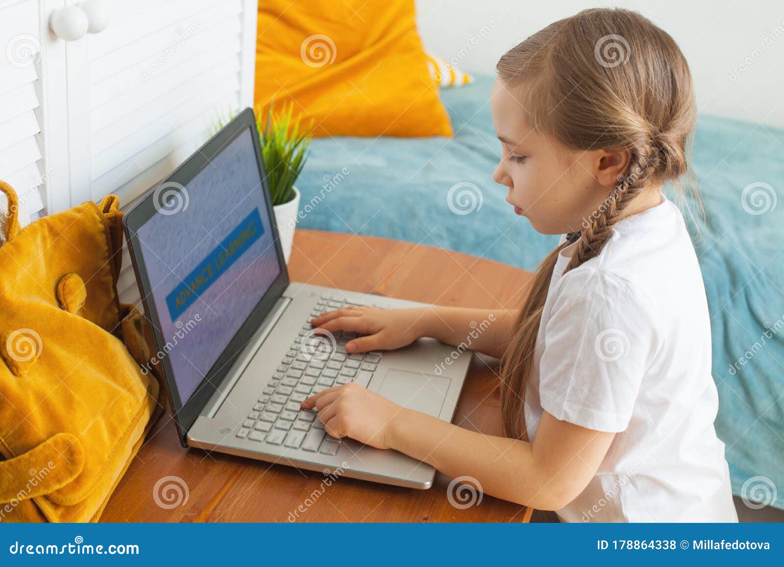 Child Using Laptop at Home. Distance Learning and on-line Education ...