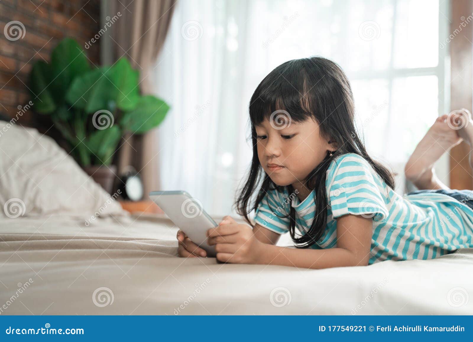 Child Using Smartphone at Home Stock Image - Image of gadget, relaxing ...