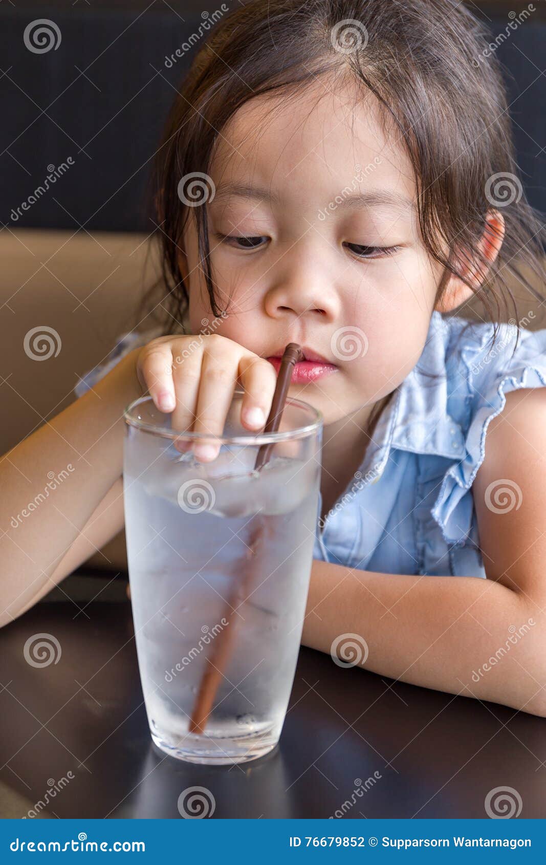 Child Using Straw To Drink Water from Glass Stock Photo - Image of girl ...