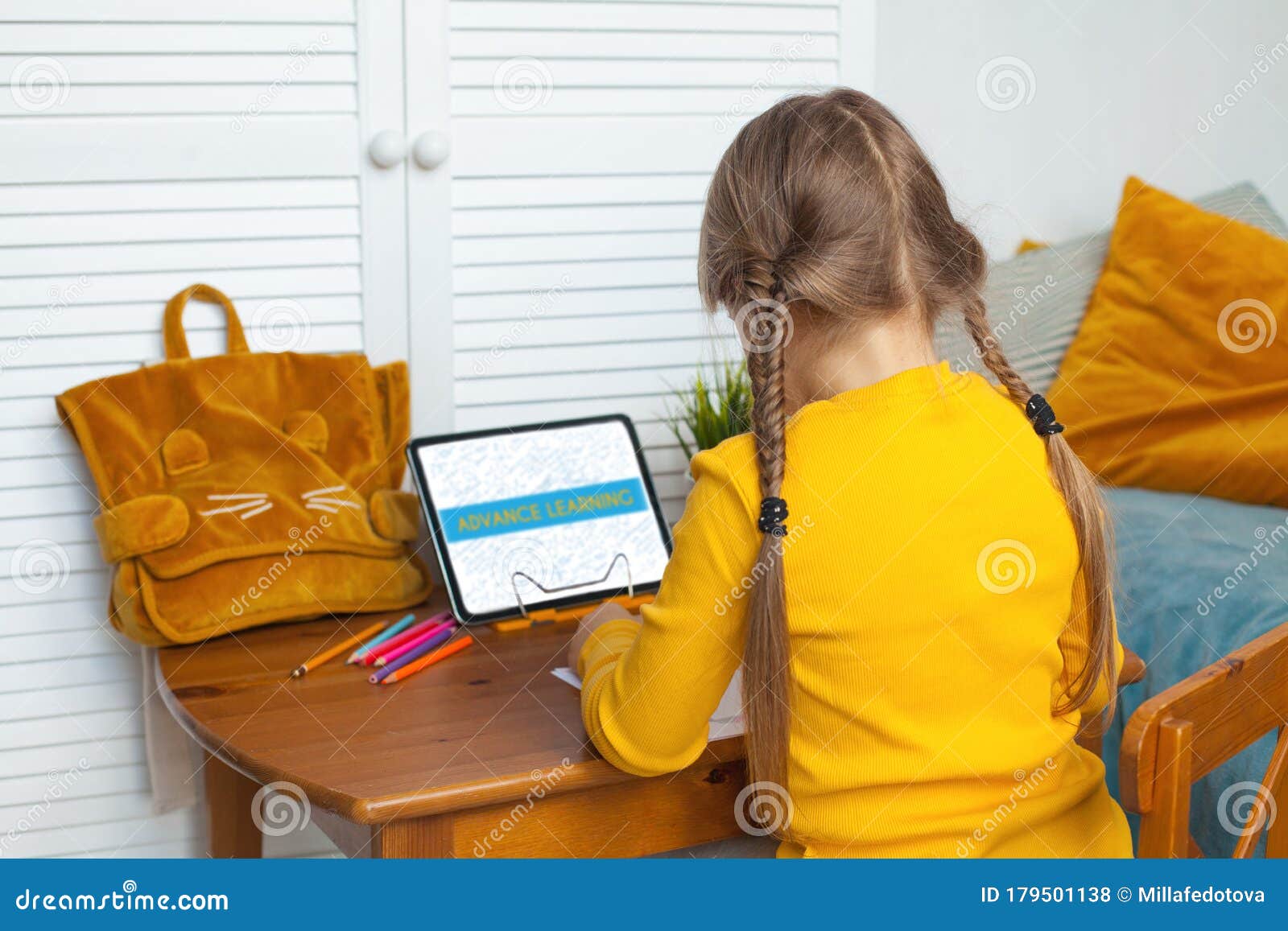 Child using tablet at home stock photo. Image of drawing - 179501138