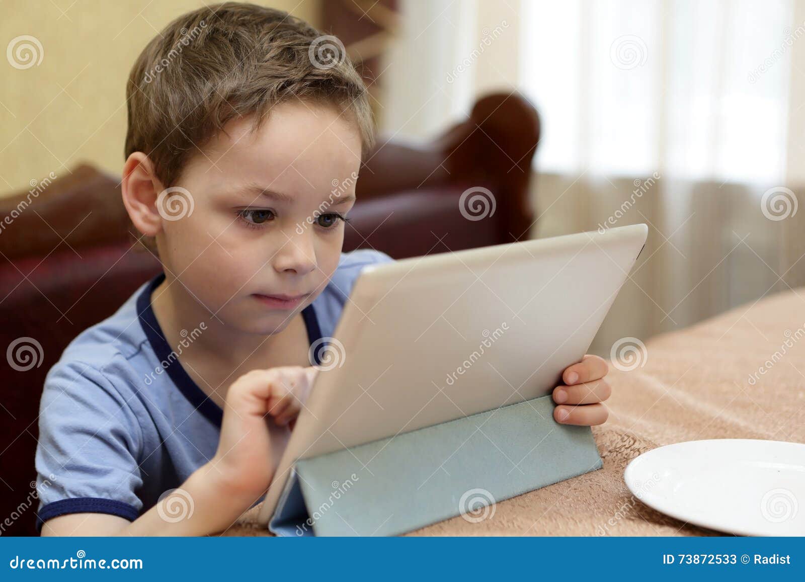 Child using tablet PC stock image. Image of child, finger - 73872533