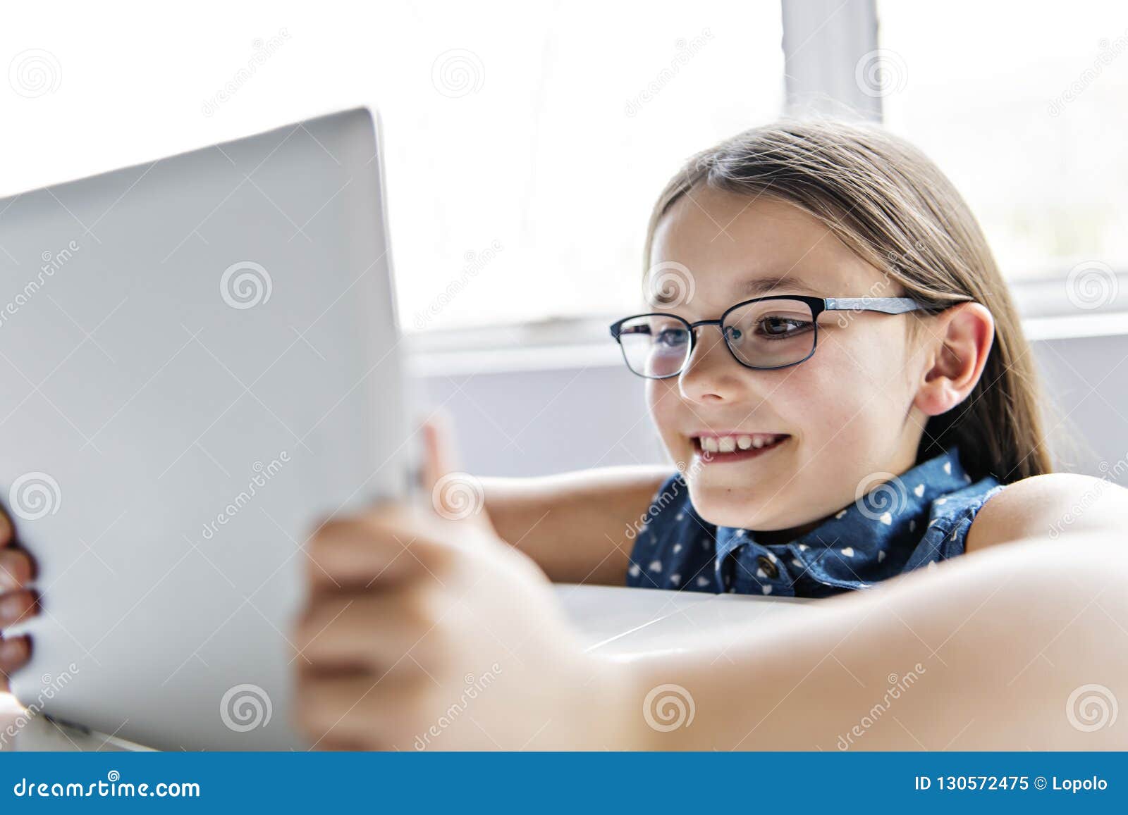 A Cute Child Using Tablet at School Stock Image - Image of notebook ...
