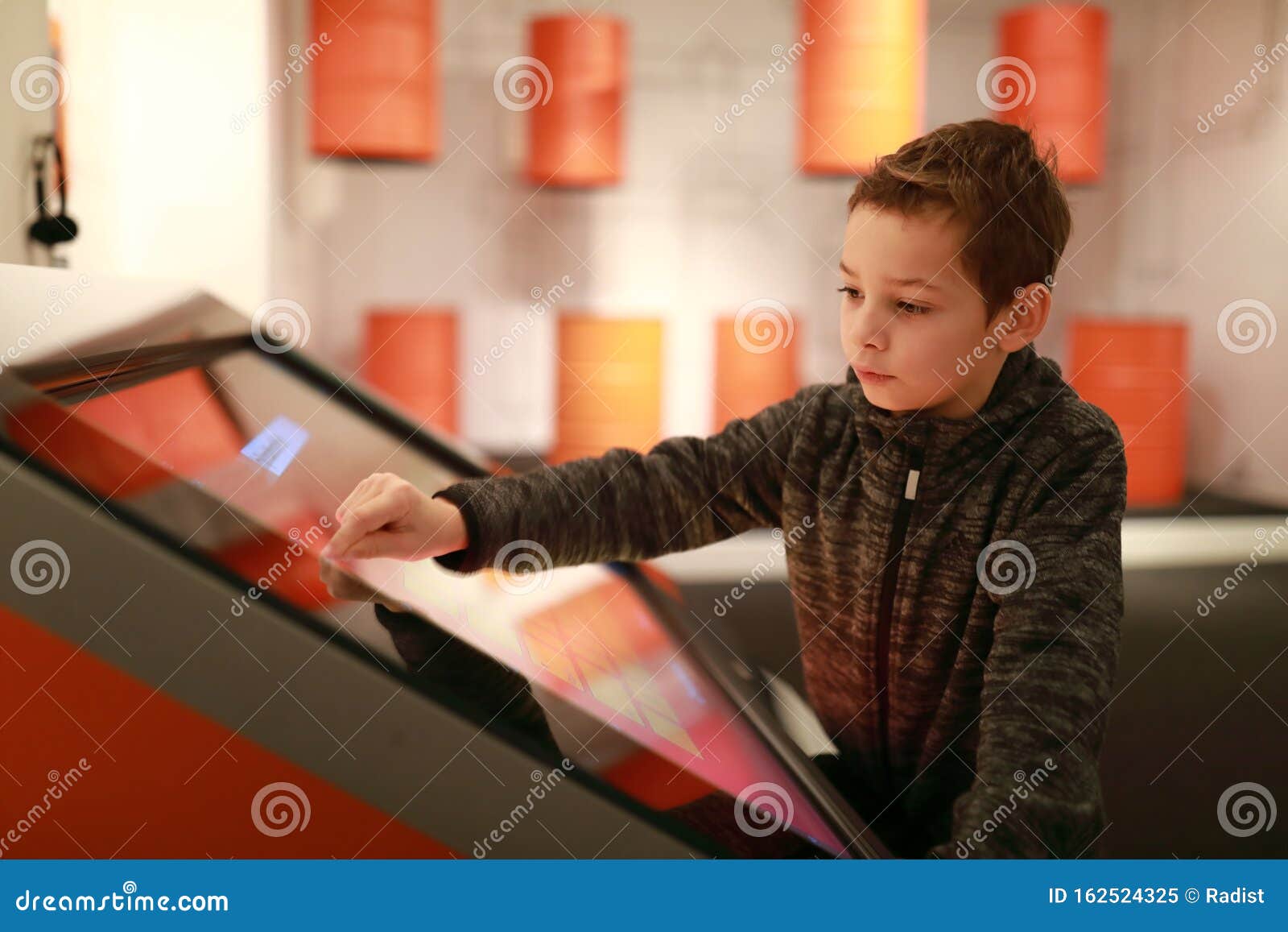 Child using touch screen stock image. Image of computer - 162524325
