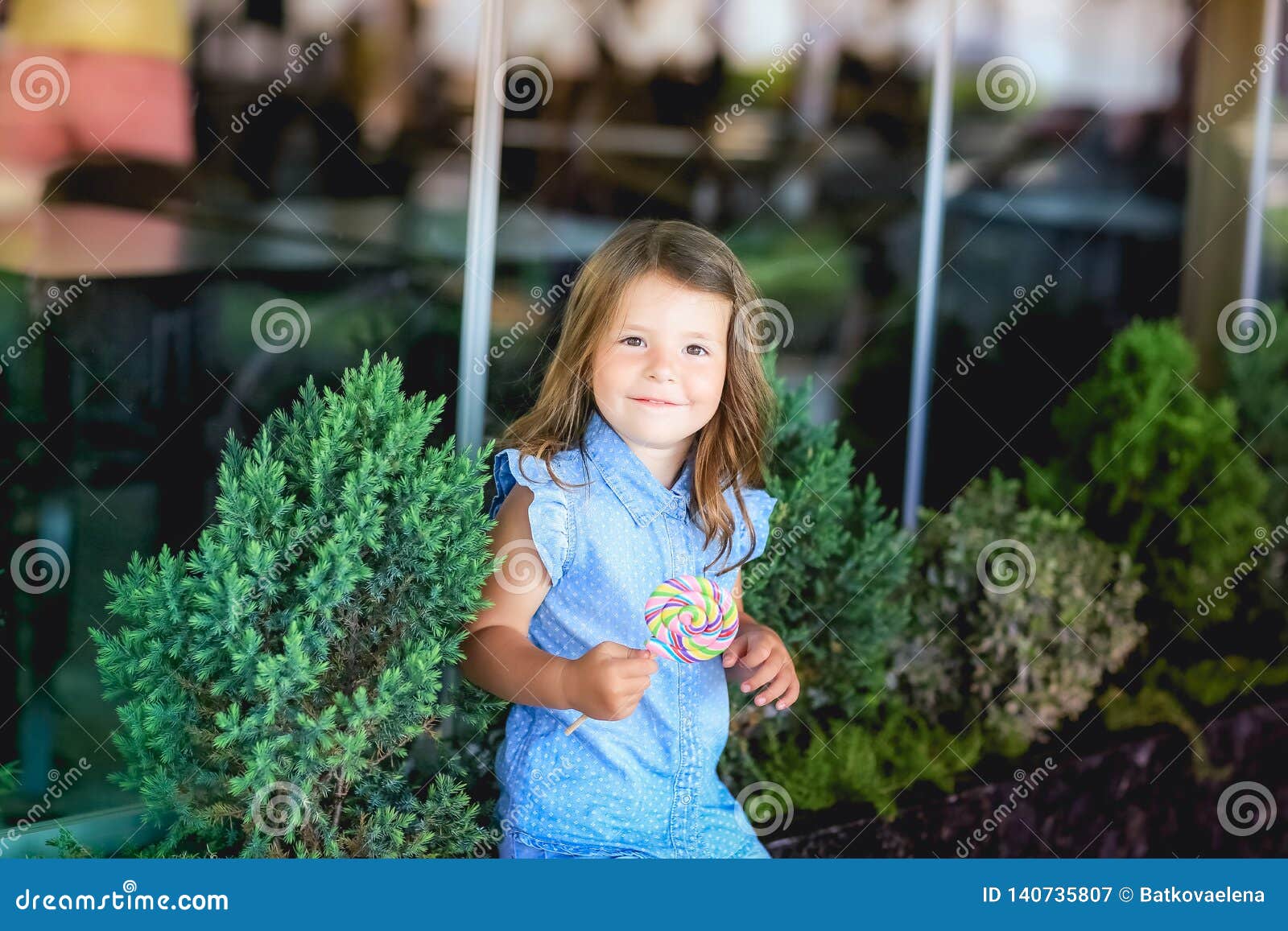 Child for a Walk in the Park with Candy in Hand Stock Image - Image of ...