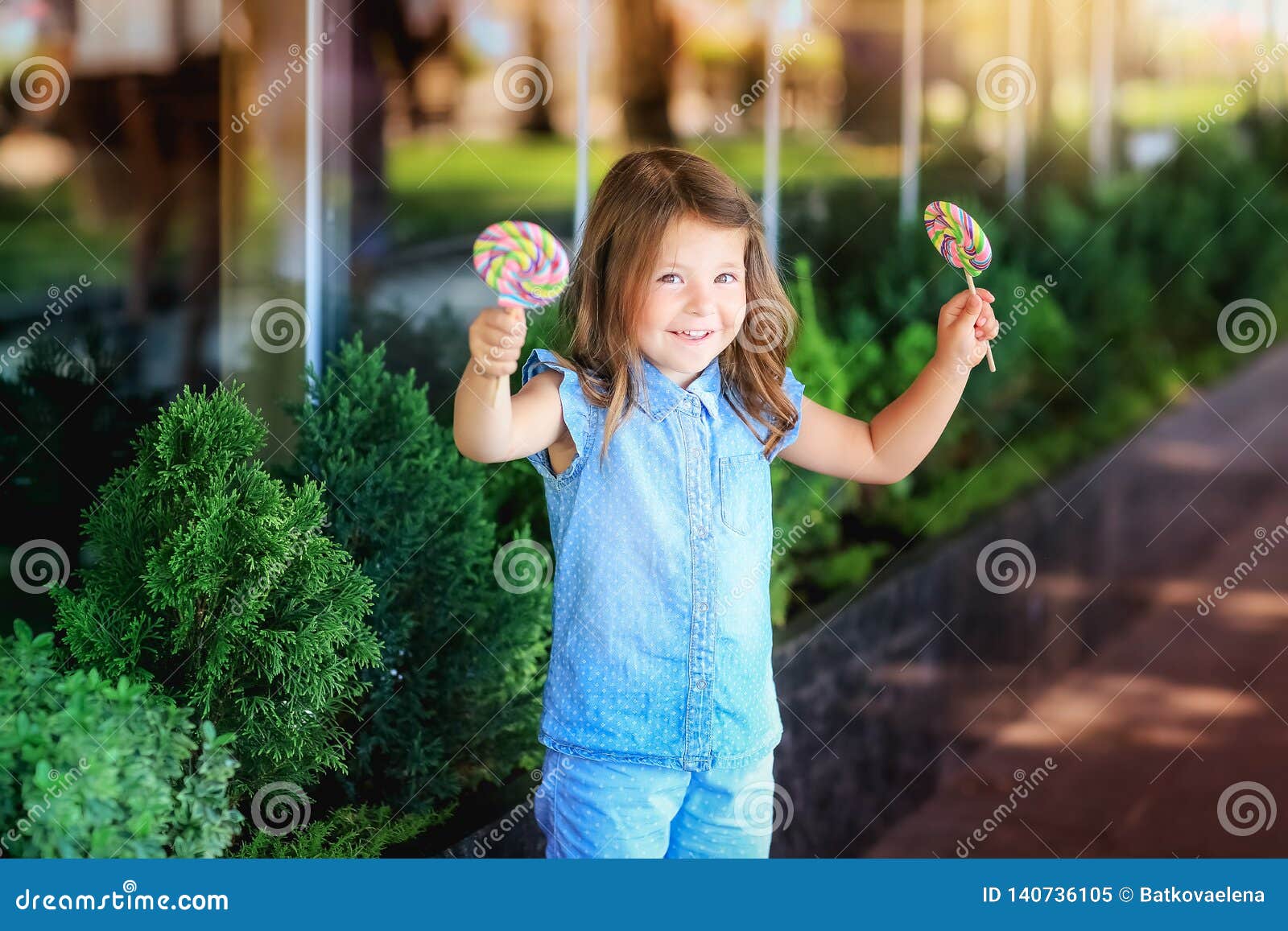 Child for a Walk in the Park with Candy in Hand Stock Image - Image of ...