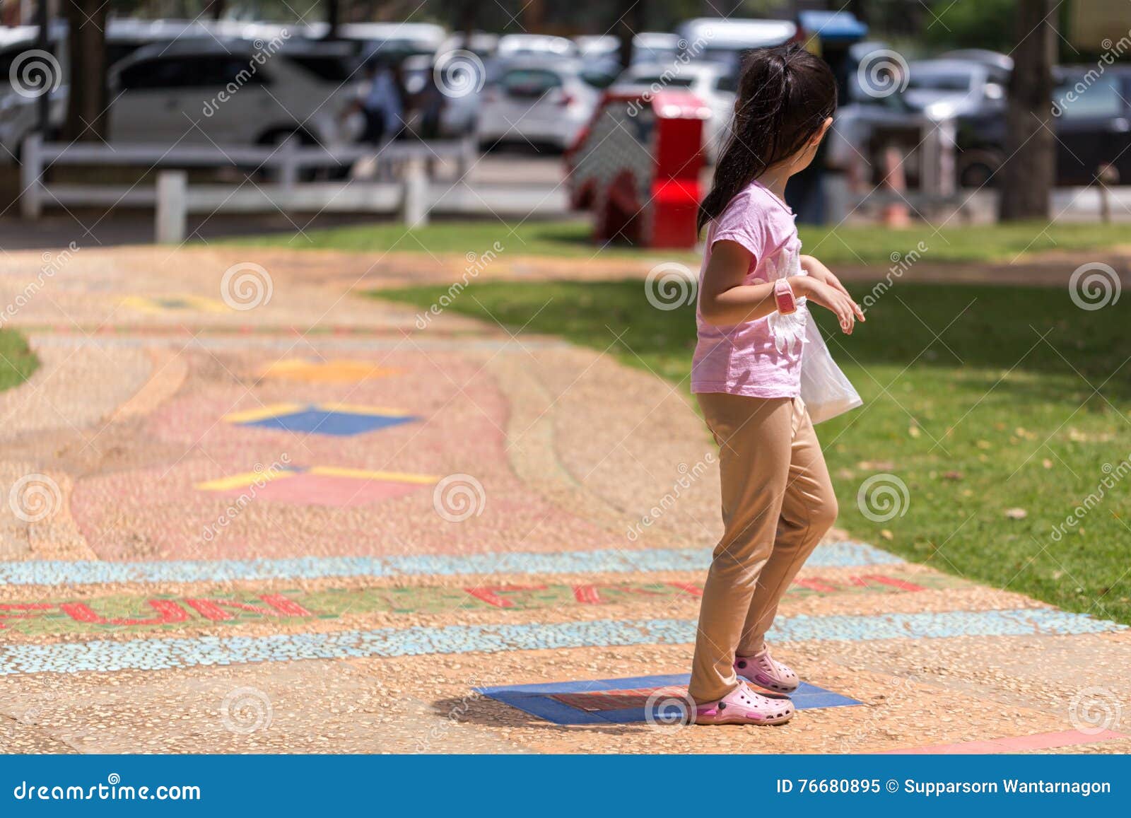 Child Walking in Park stock image. Image of child, alone - 76680895