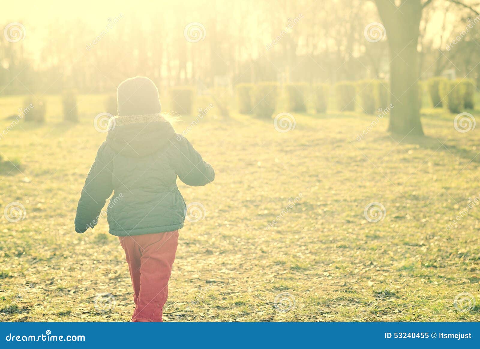 Child walking in sunlight. stock image. Image of beauty - 53240455