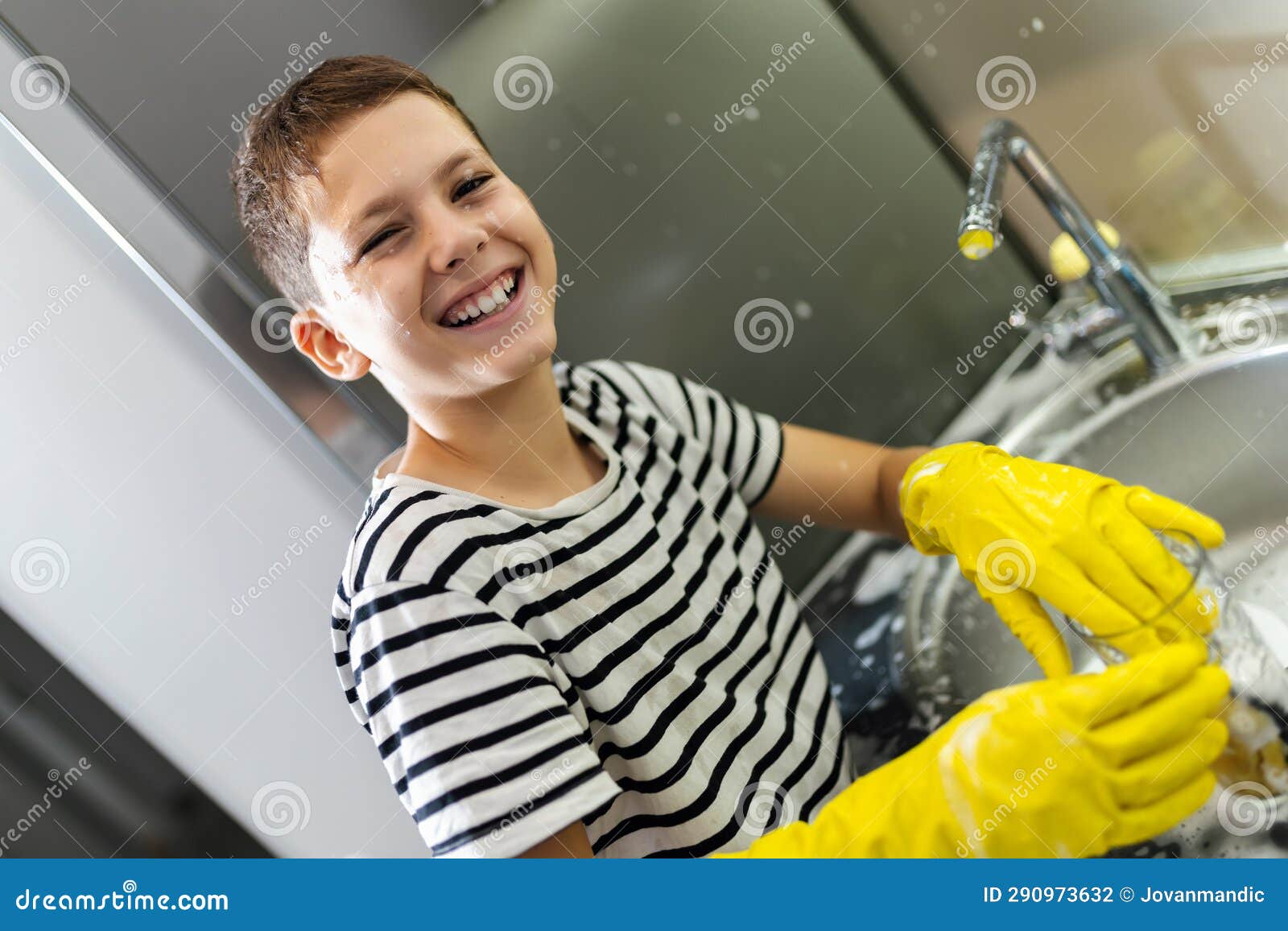 Child Washing the Dishes in the Sink and Having Fun Stock Photo - Image ...