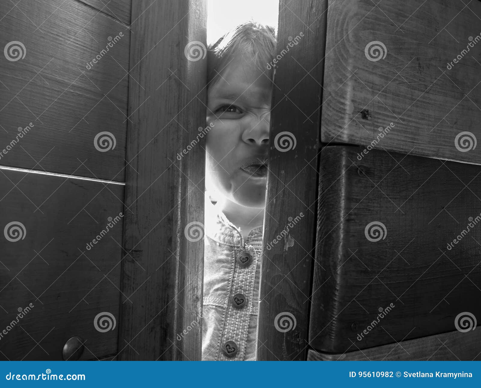 Child is Watching Over the Fence Stock Photo - Image of tiptoe ...
